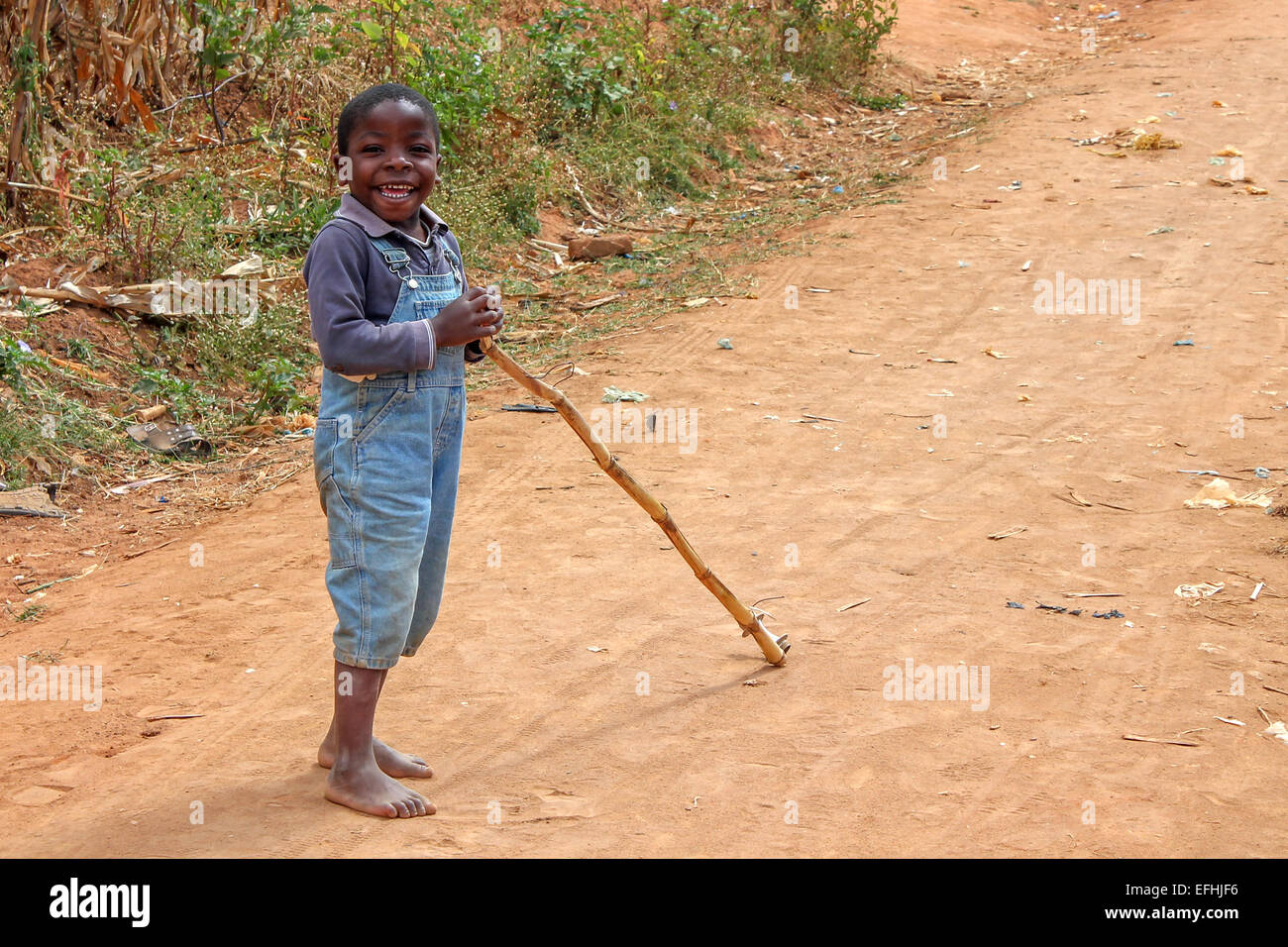 Happy boy in dirt hi-res stock photography and images - Alamy
