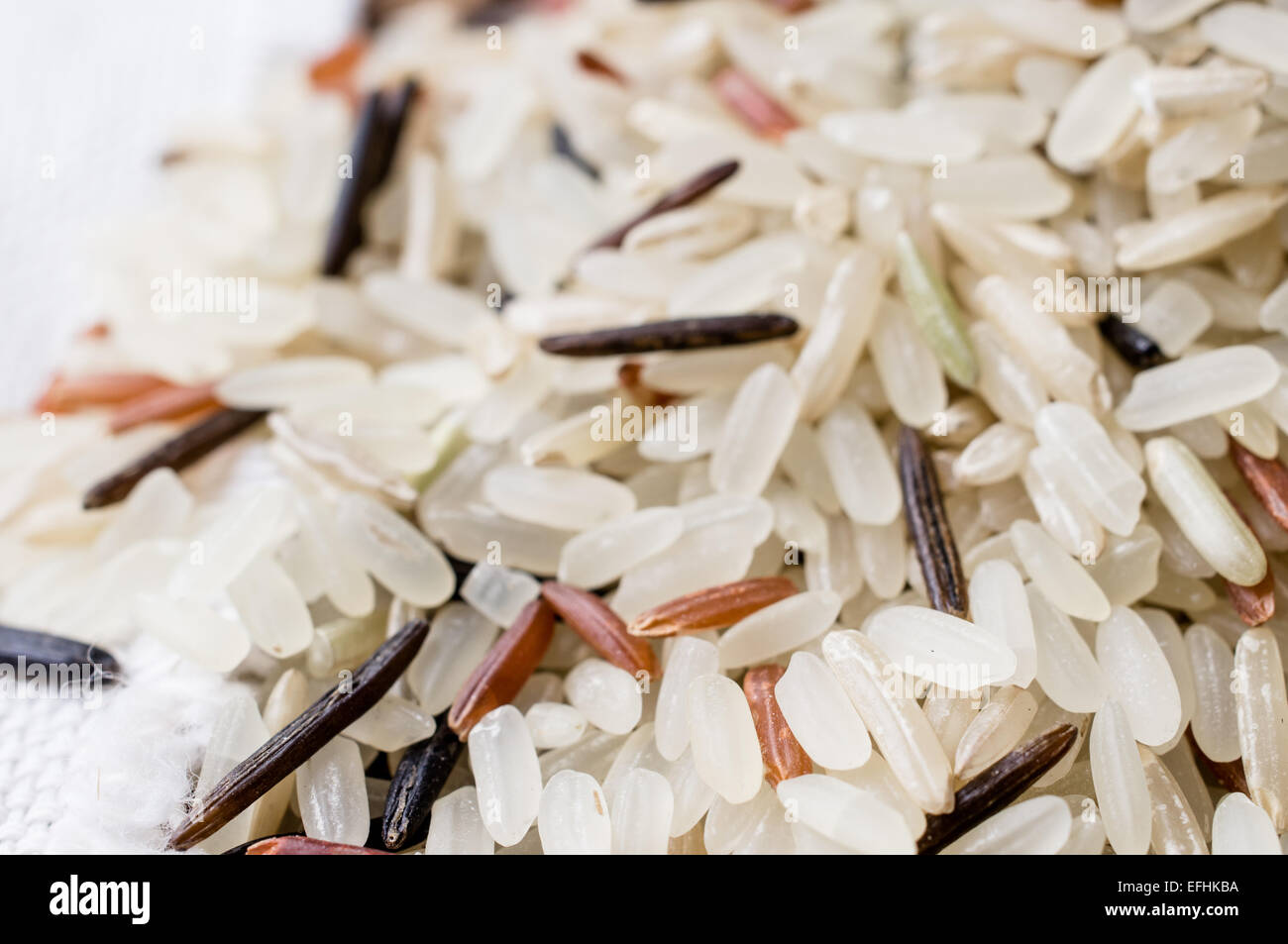 Mix of different species and varieties of rice Stock Photo - Alamy
