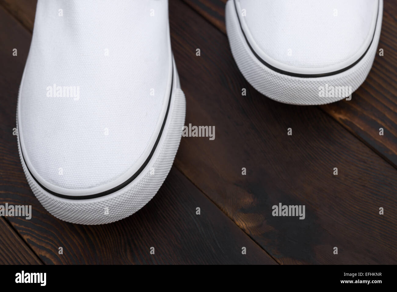 front of pair of white sneakers Stock Photo - Alamy