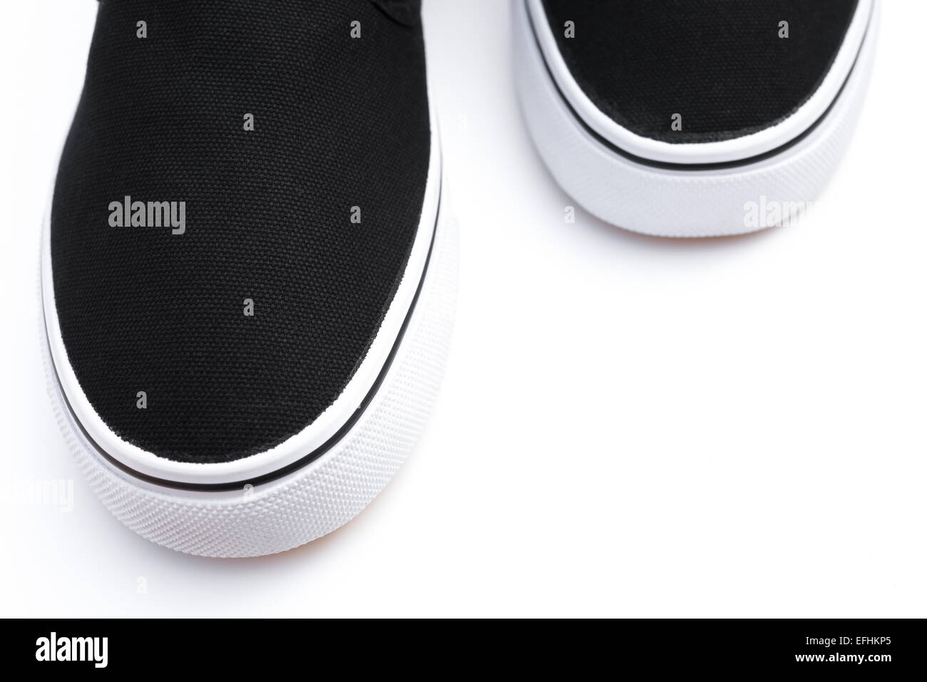 front of pair of black sneakers Stock Photo - Alamy