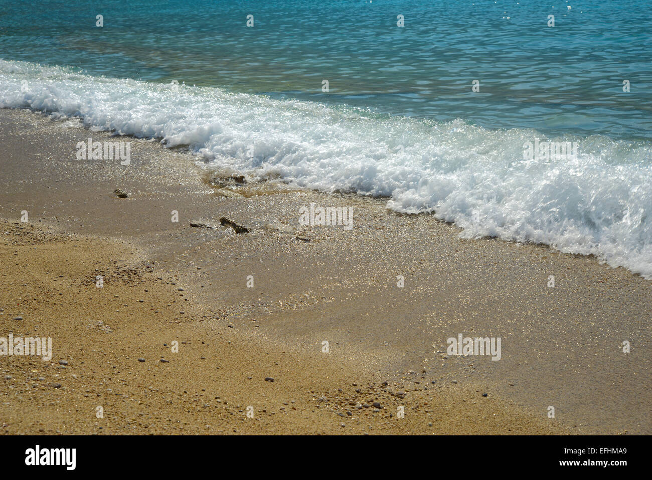 Stock image of waves on a beach illustrating summer concept Stock Photo ...