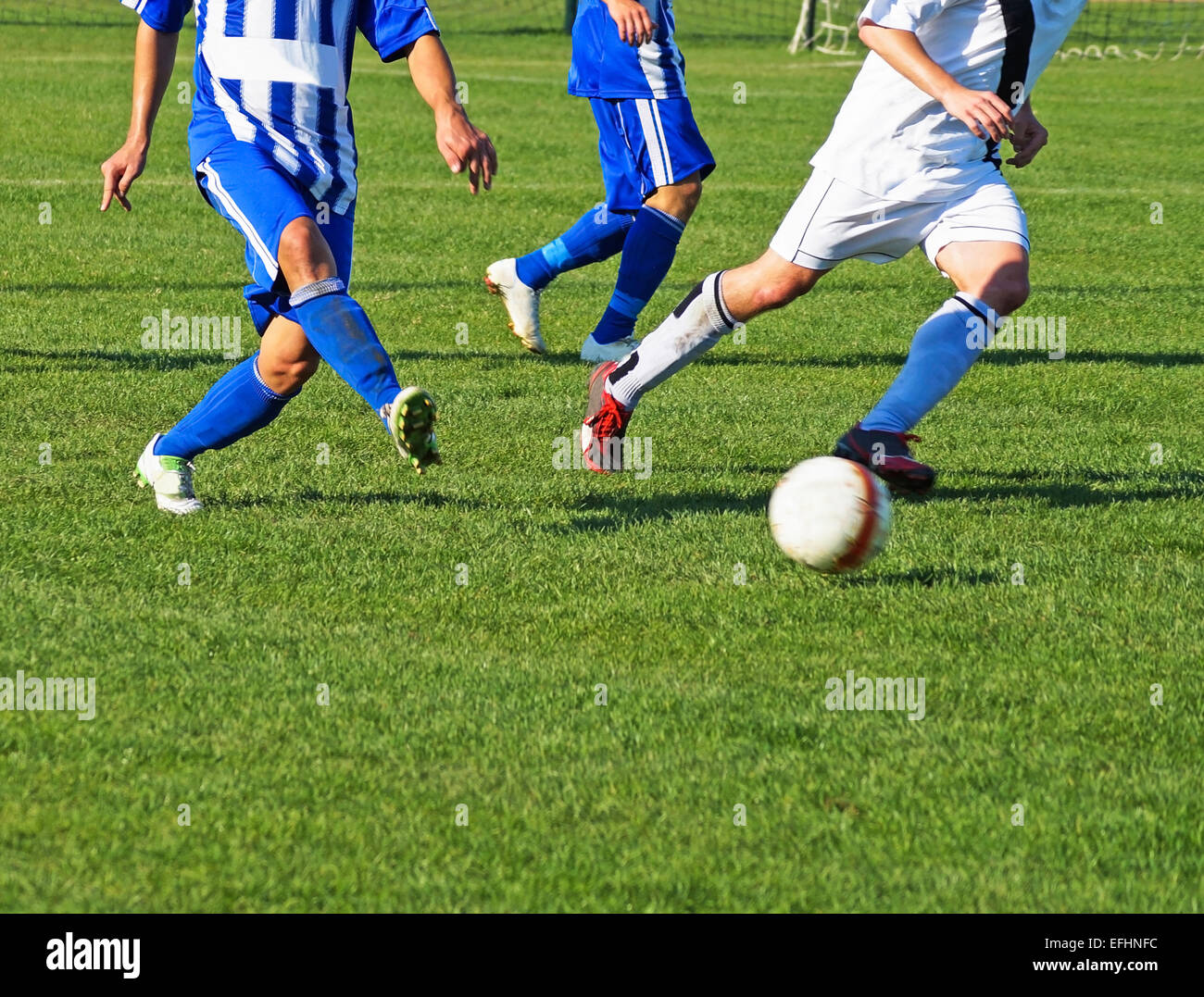 Soccer players in action hi-res stock photography and images - Alamy