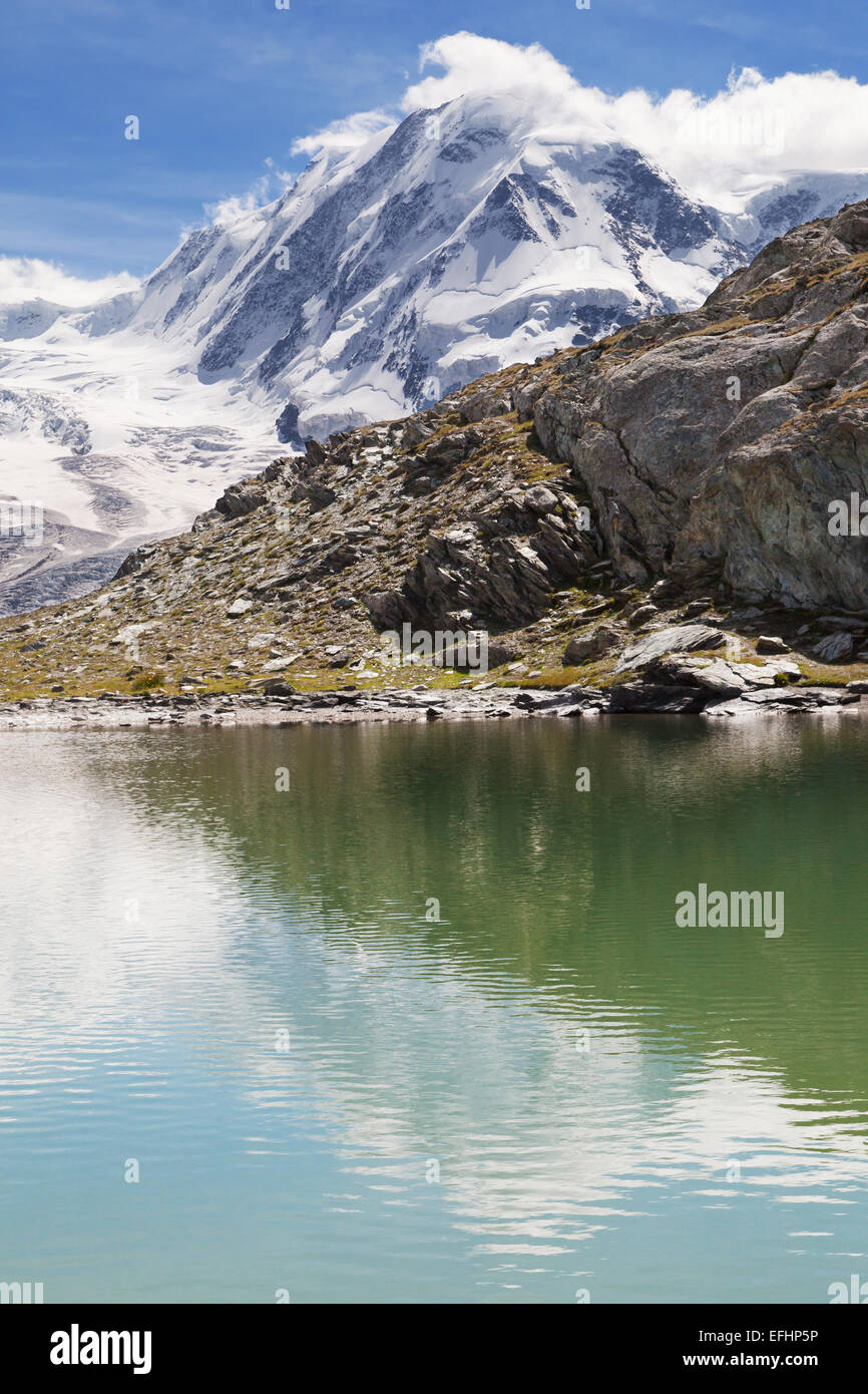 Lyskamm from the Riffelsee lake in the Swiss Alps Stock Photo - Alamy