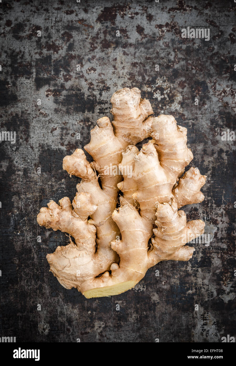Fresh ginger on dark vintage background Stock Photo - Alamy