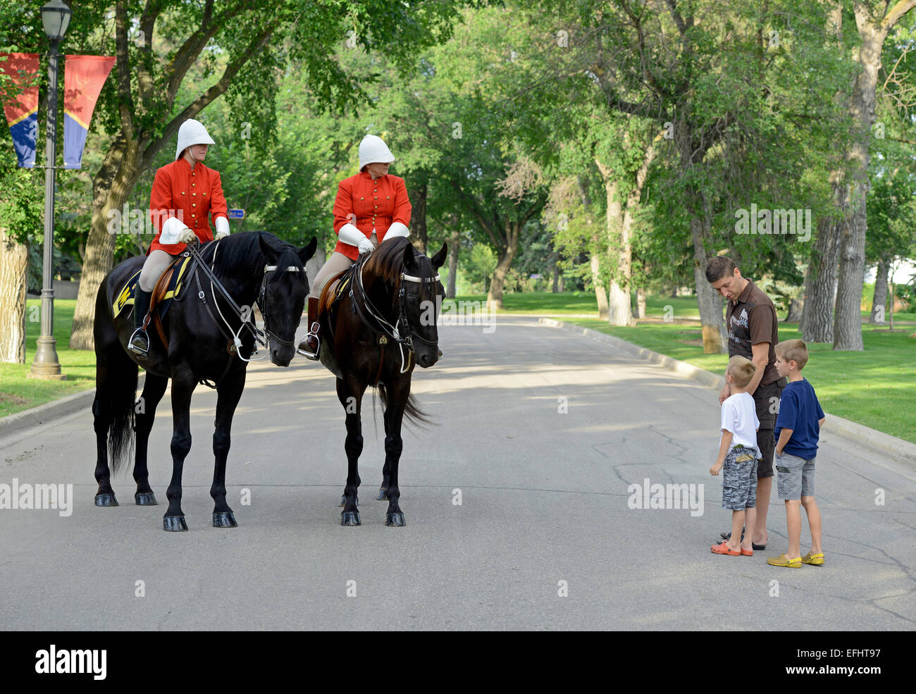 Mounties in traditional uniform on horseback at the Royal Canadian ...