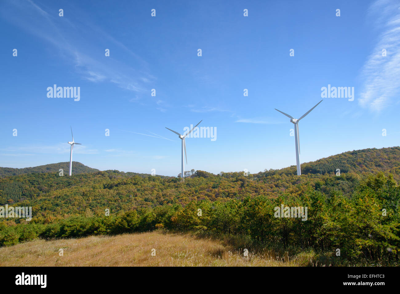 wind generator in a mountain with autumn colors Stock Photo - Alamy