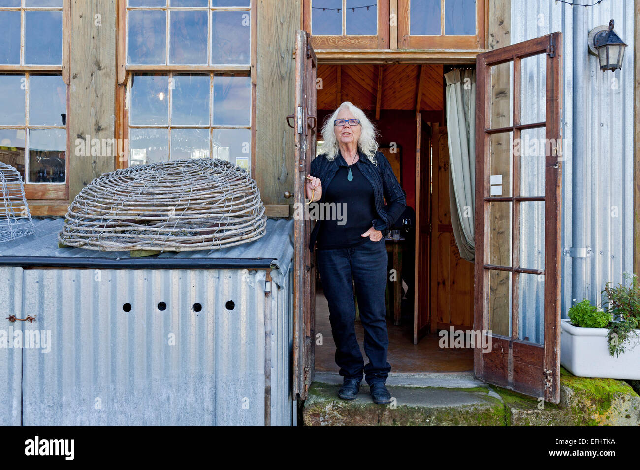 Restaurant owner Fleur Sullivan at Fleurs Place, Moeraki, South Island ...