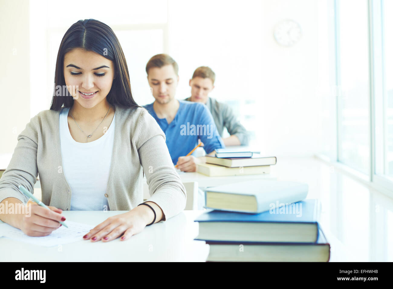 Pretty brunette college student hi-res stock photography and images - Alamy