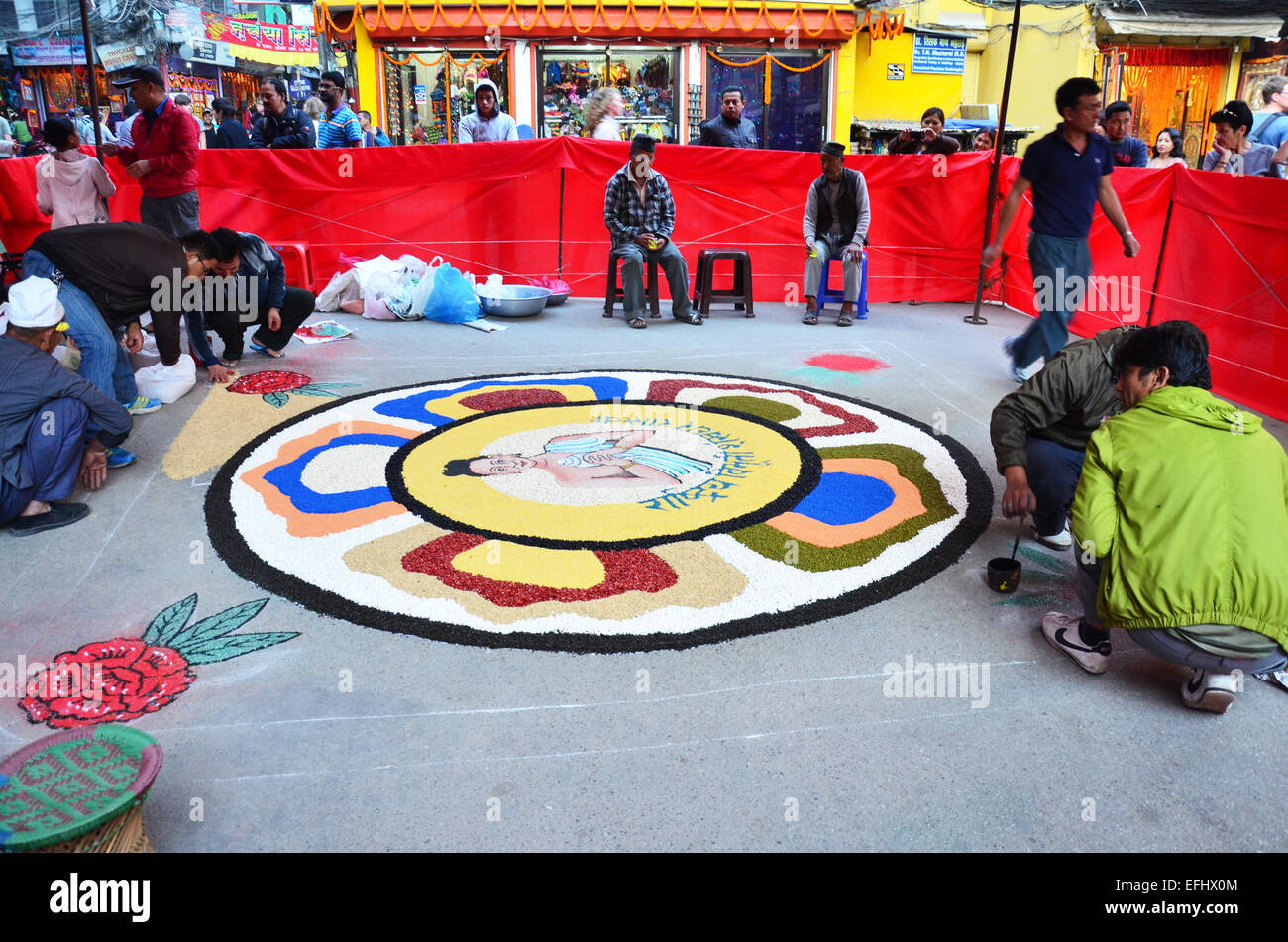 Nepalese people painting art from sand color for contest of Celebrating ...