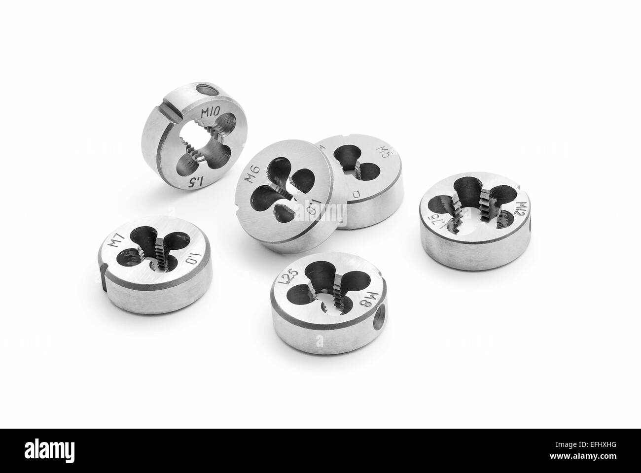 thread cutting die on a white background Stock Photo - Alamy