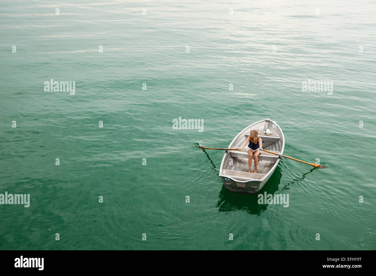 Young people in a rowing boat hi-res stock photography and images - Alamy