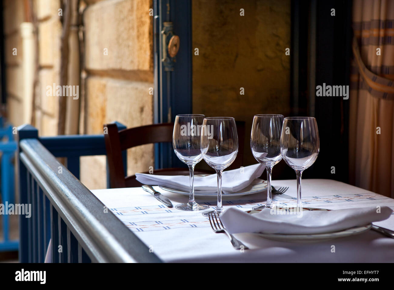 Table set in a French bistro Stock Photo - Alamy
