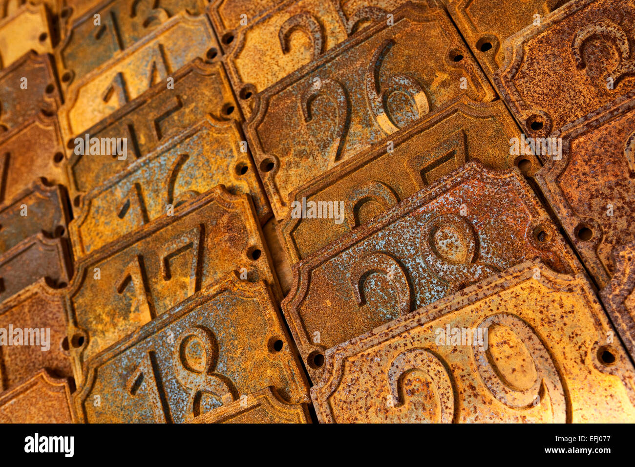 Numbers on rusty metal plates Stock Photo - Alamy