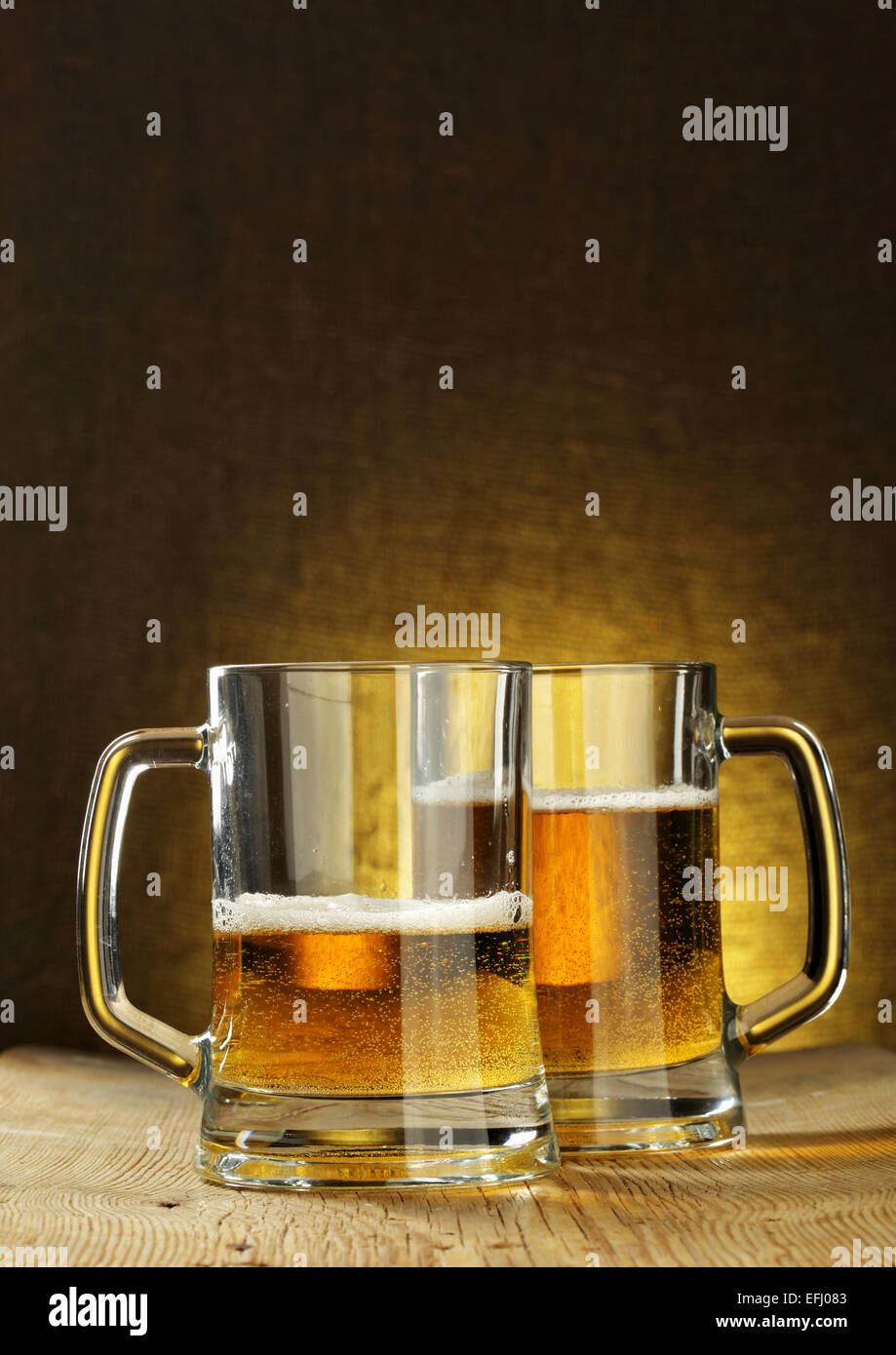 Close up two glass mugs hi-res stock photography and images - Alamy