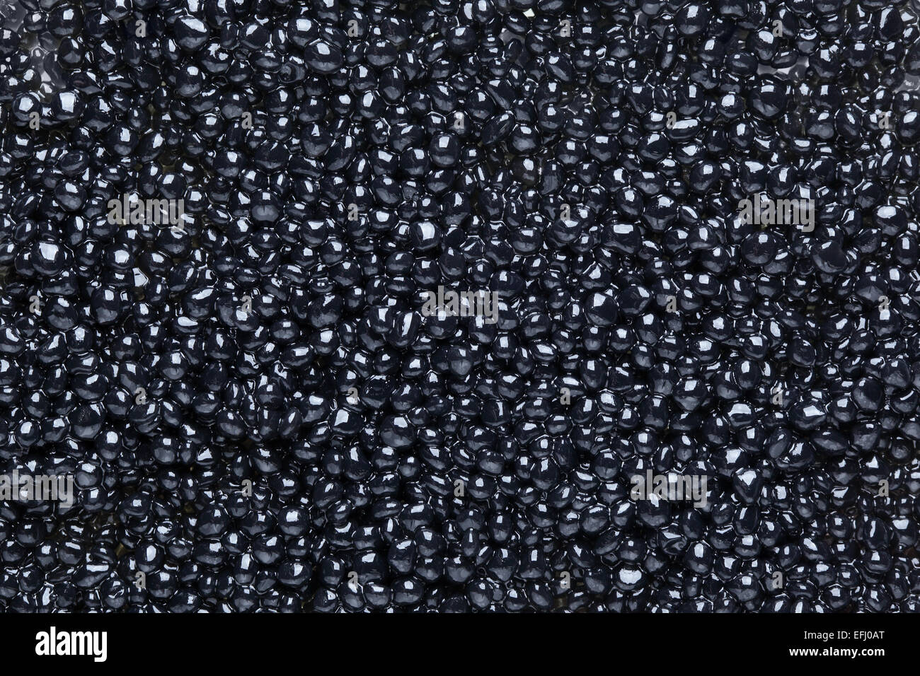 Black caviar texture close up Stock Photo - Alamy