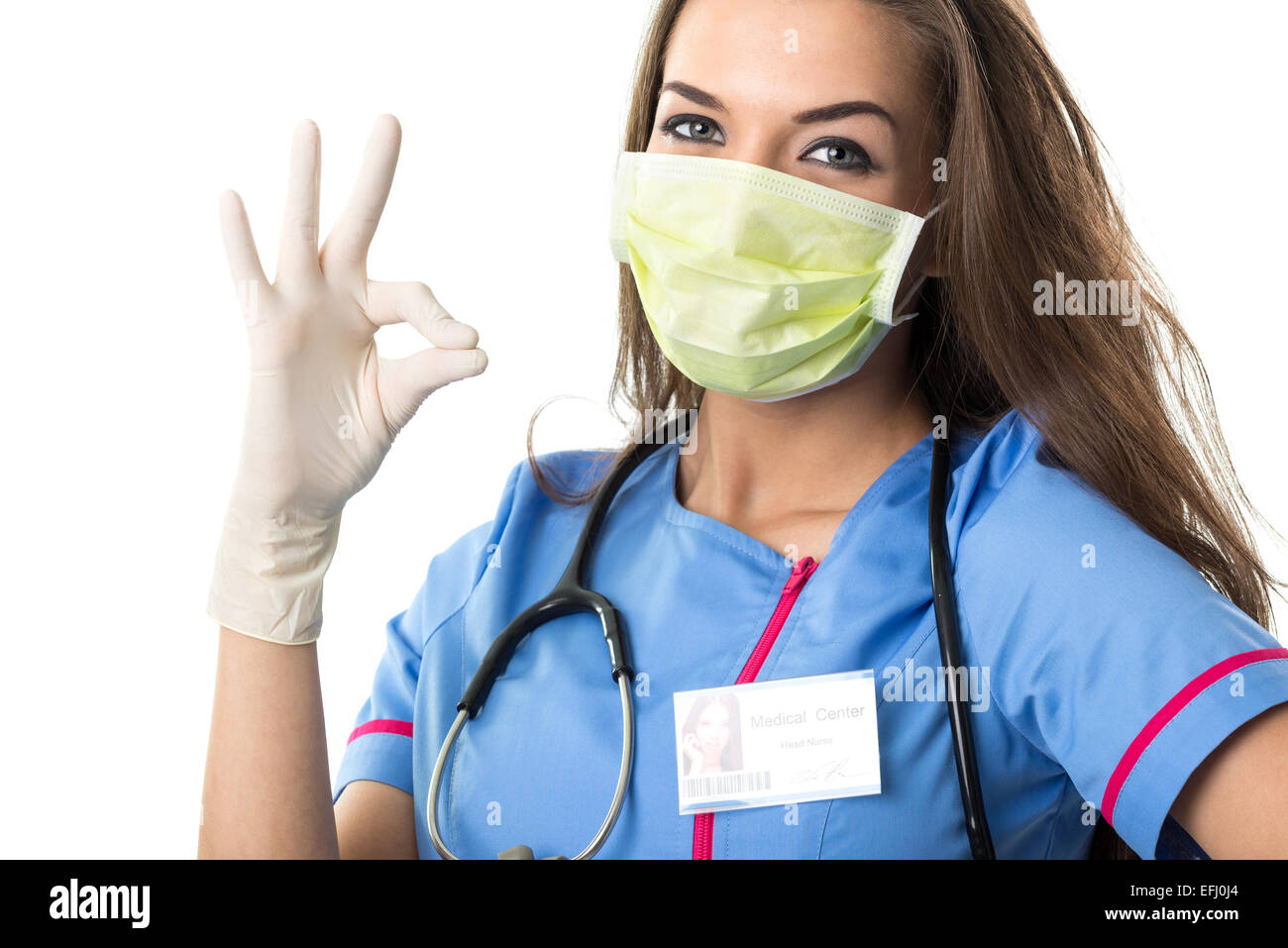 Young cute nurse in mouth mask, detail photo Stock Photo - Alamy