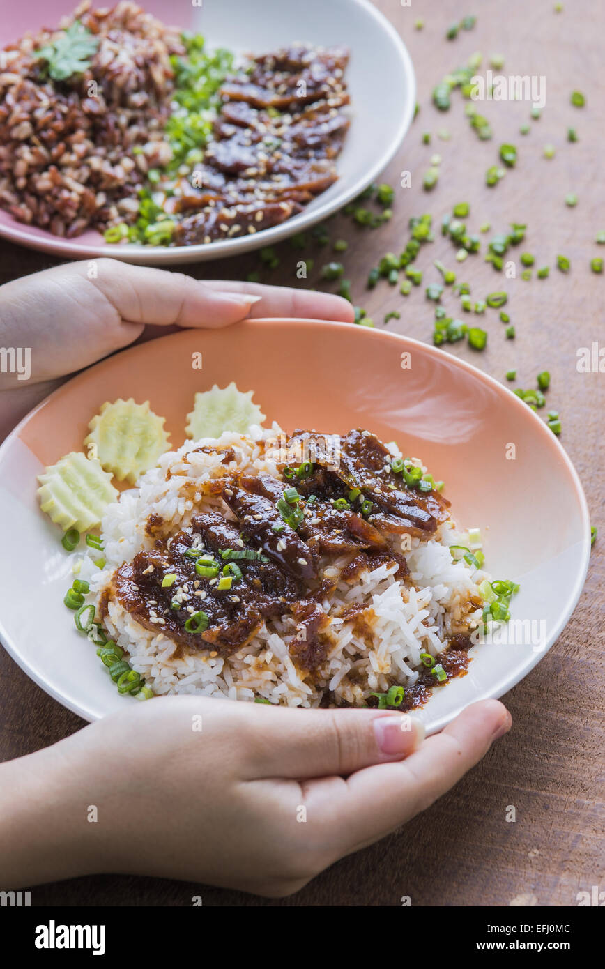 Baked meat with honey eating with rice and green onion Stock Photo - Alamy