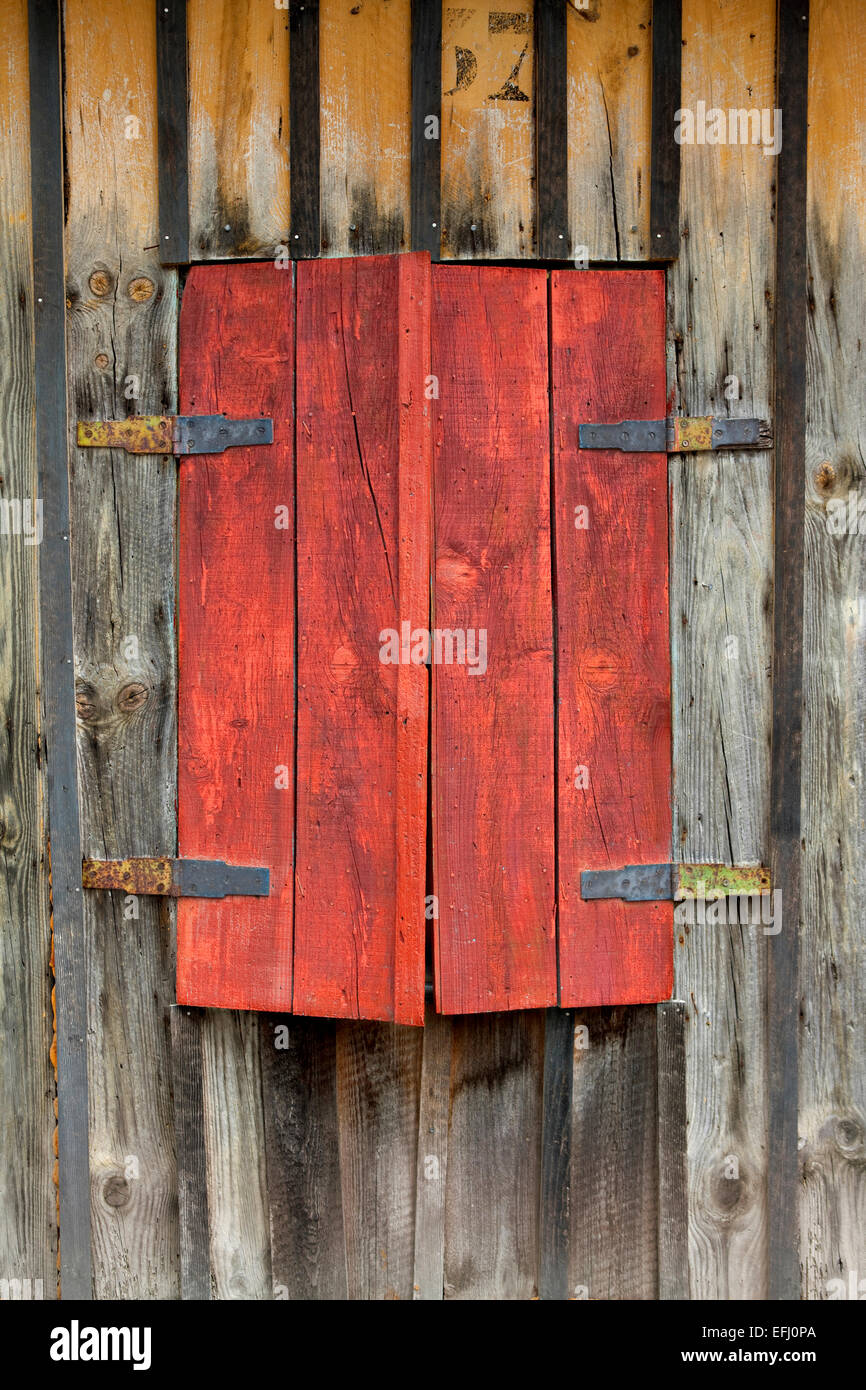 Shutter of a wooden hut Stock Photo - Alamy