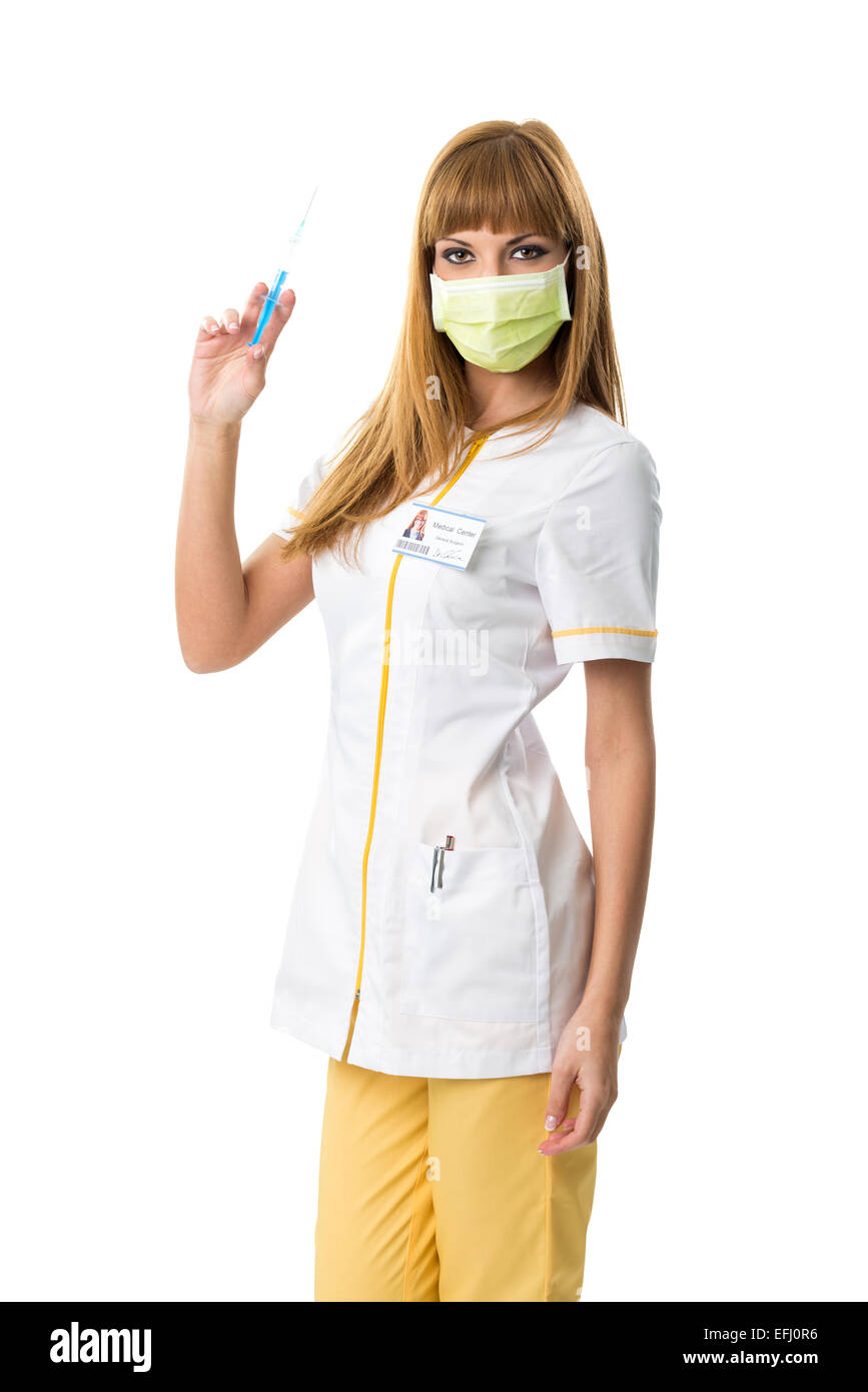 Pretty young nurse in mouth mask with injection Stock Photo - Alamy