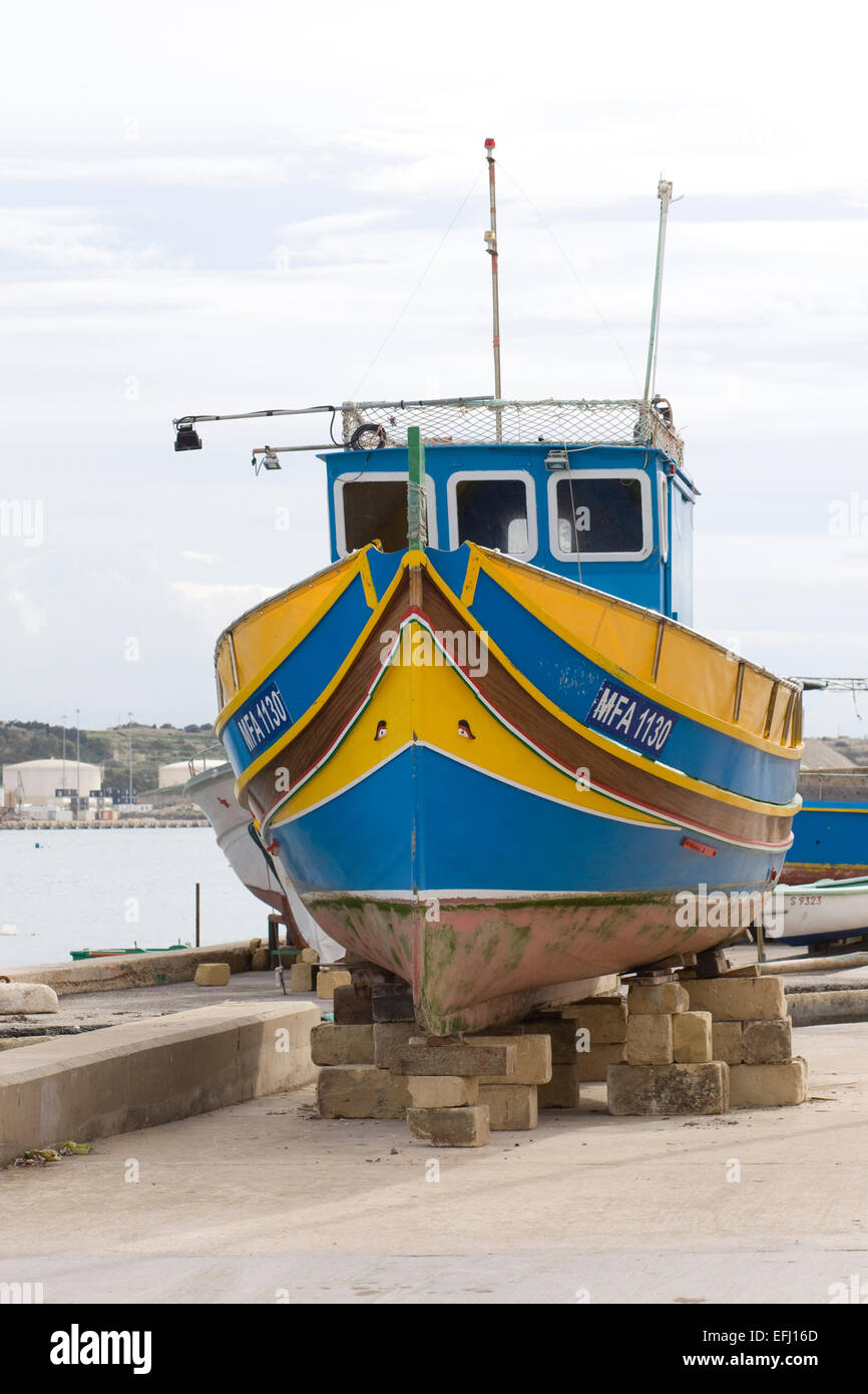 Fishing Boat on blocks in dry docks Malta Stock Photo - Alamy