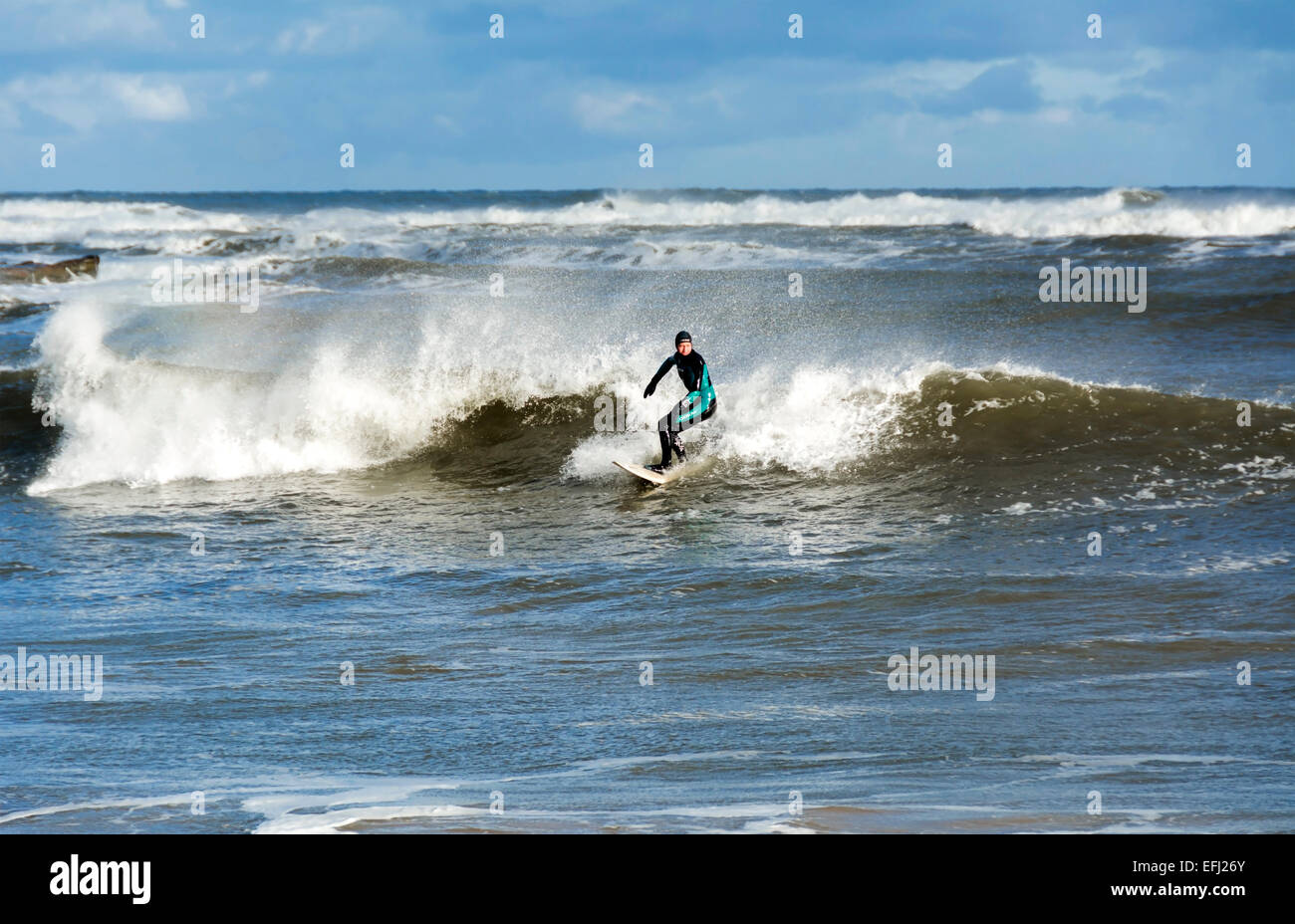 A man practising surfing in the big waves after a winter storm Stock ...