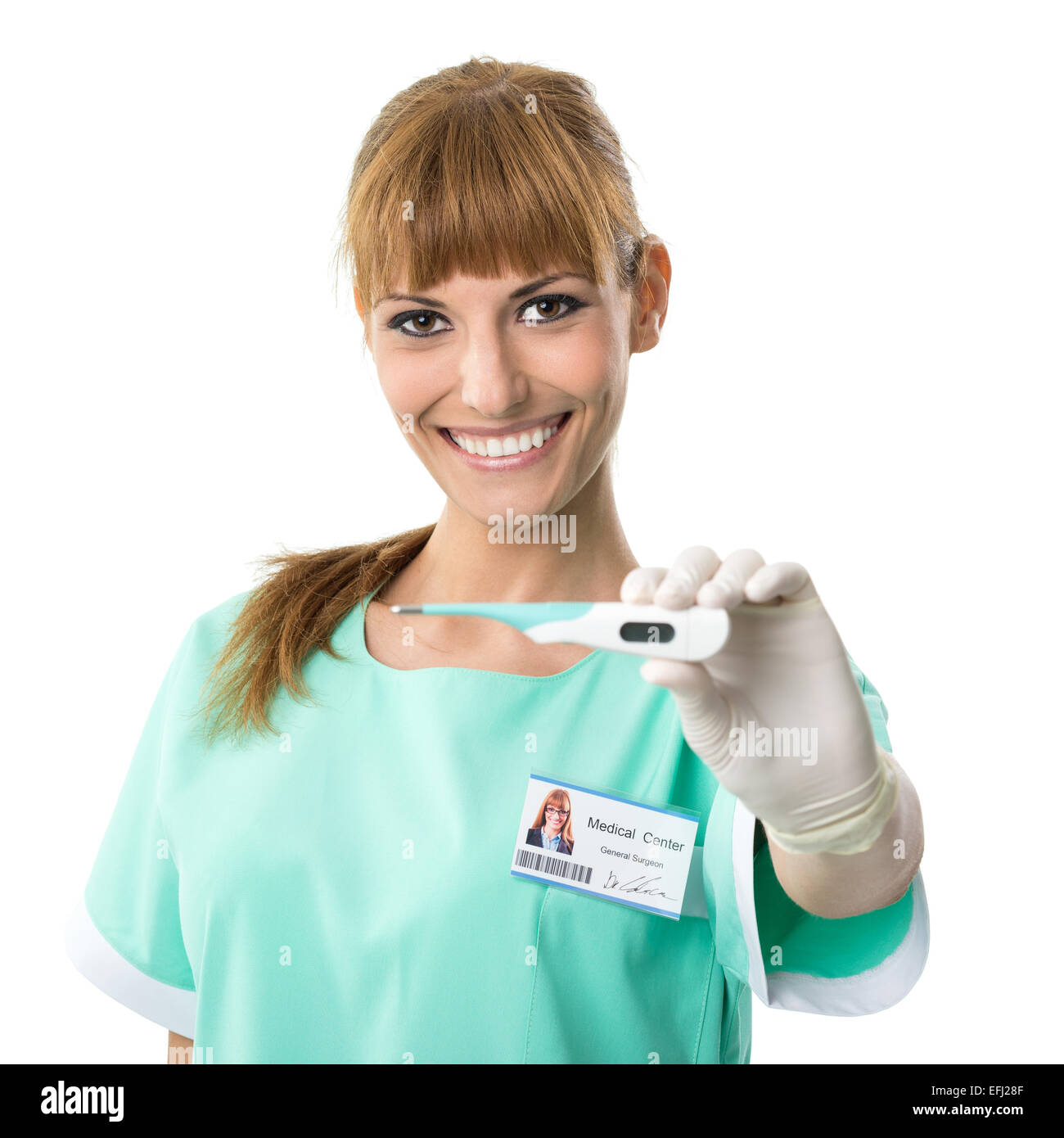 Beautiful nurse showing thermometer Stock Photo - Alamy