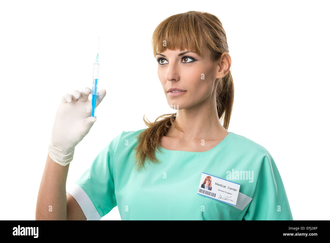 Beautiful nurse with injection Stock Photo - Alamy