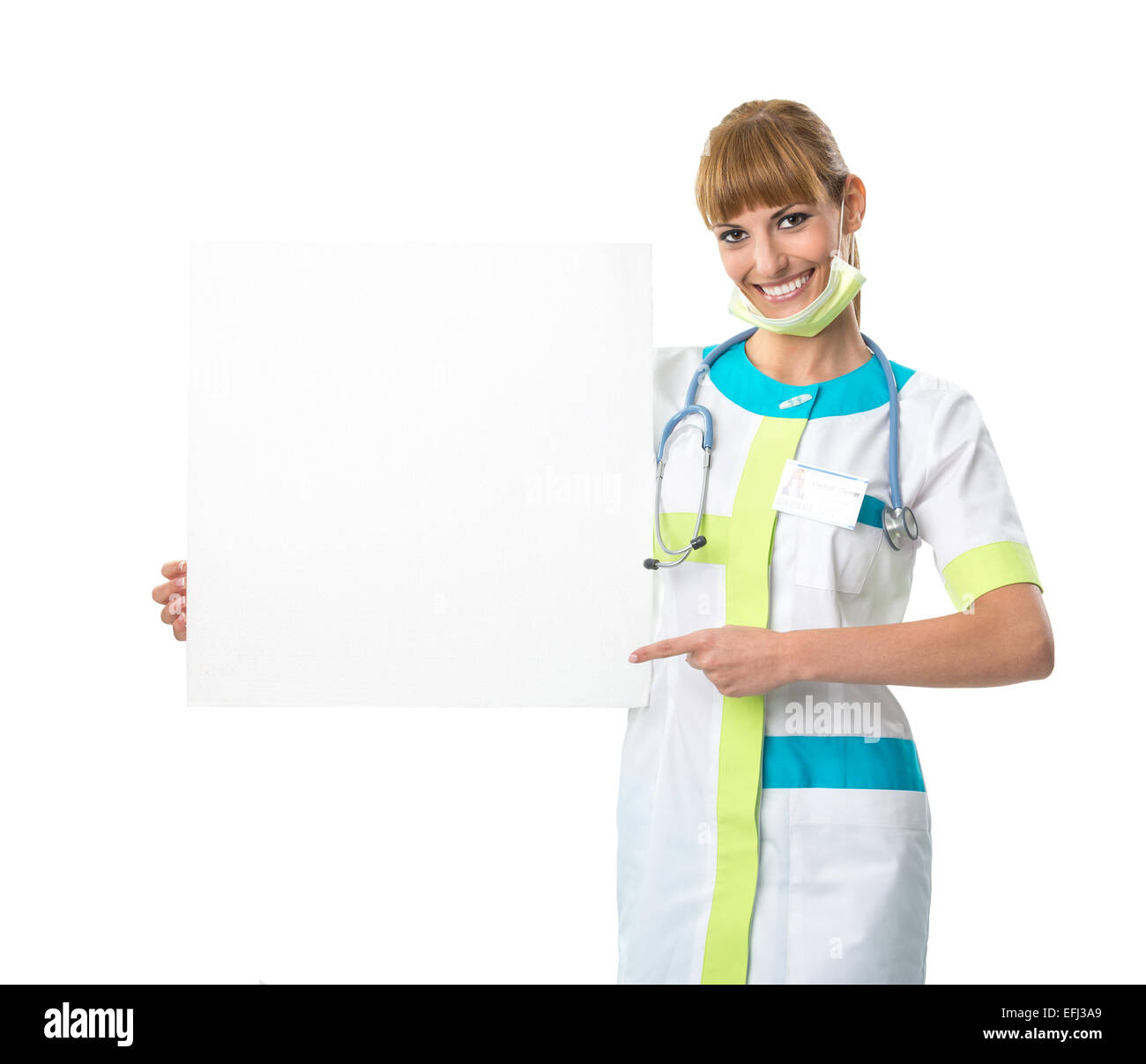 Beautiful young woman doctor showing blank board Stock Photo - Alamy