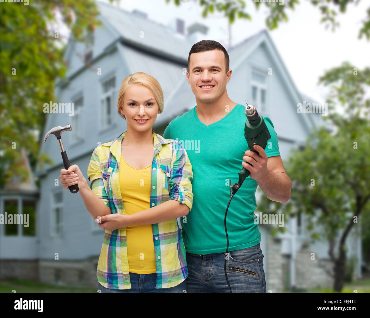 Happy family over house hi-res stock photography and images - Alamy