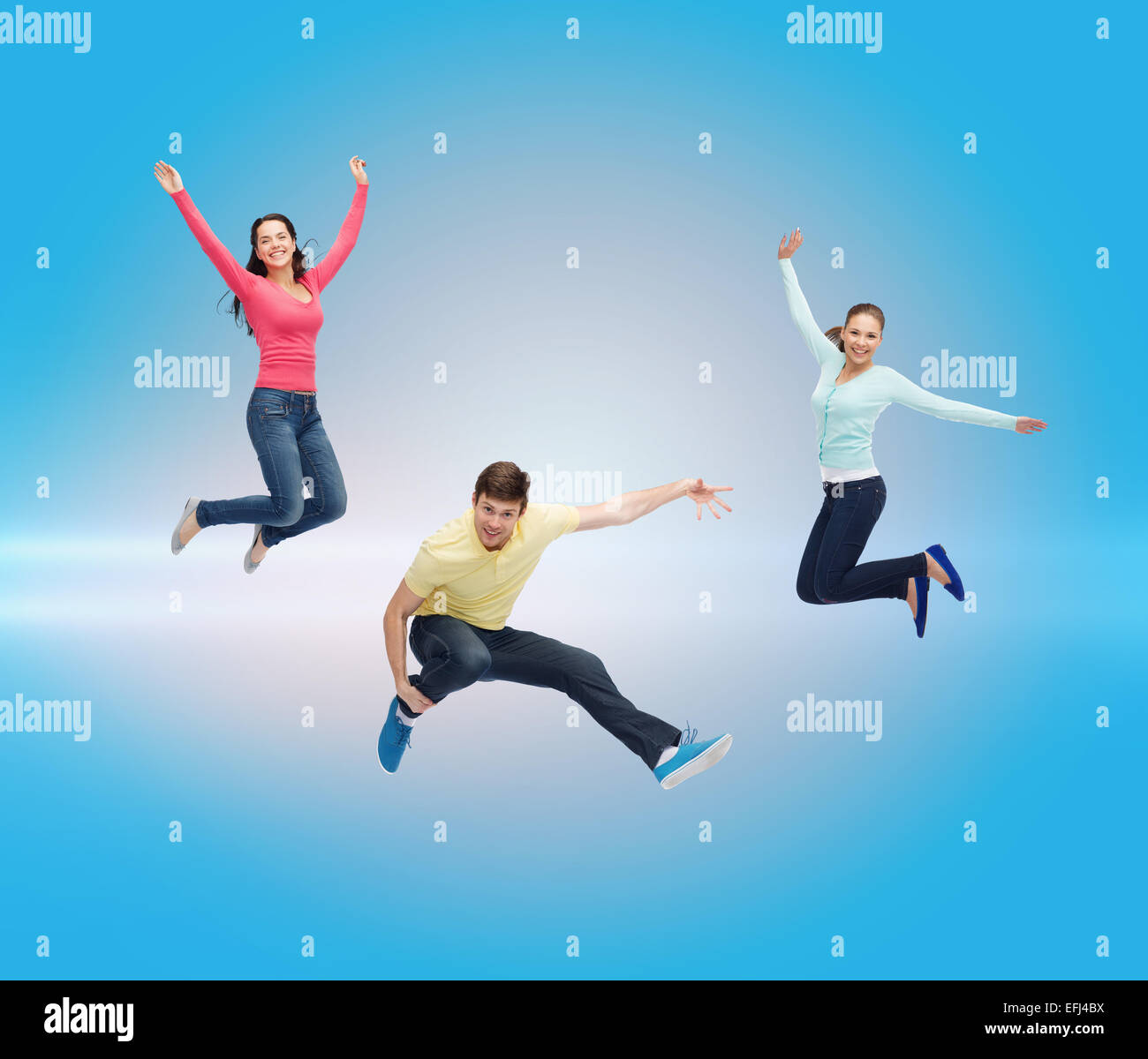 group of smiling teenagers jumping in air Stock Photo - Alamy