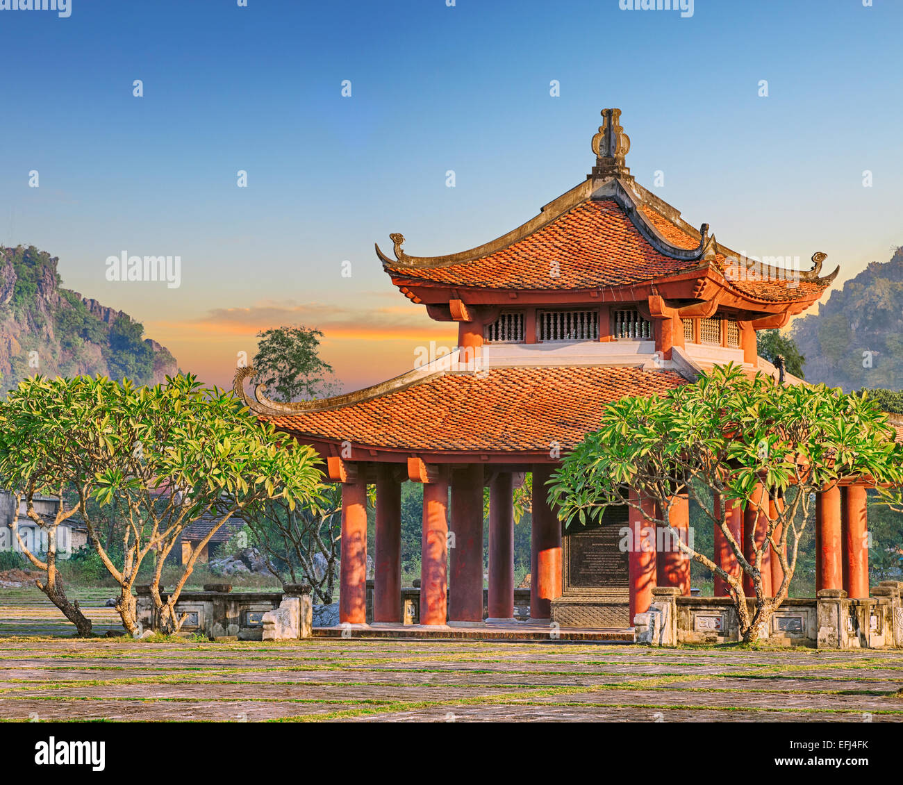 Oriental chinese traditional red temple during sunrise Stock Photo - Alamy