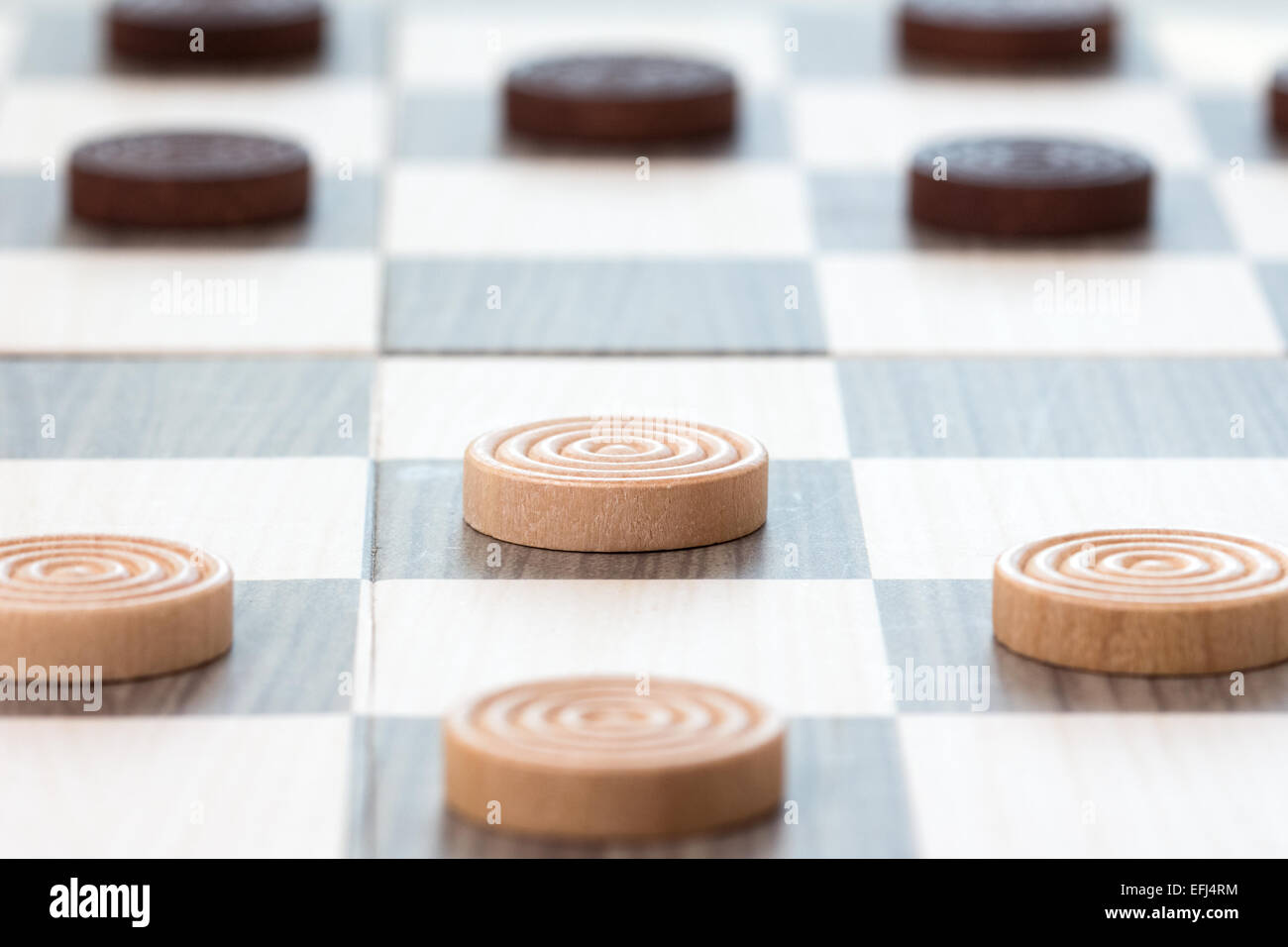 Close-up photo of the checkers board game Stock Photo - Alamy