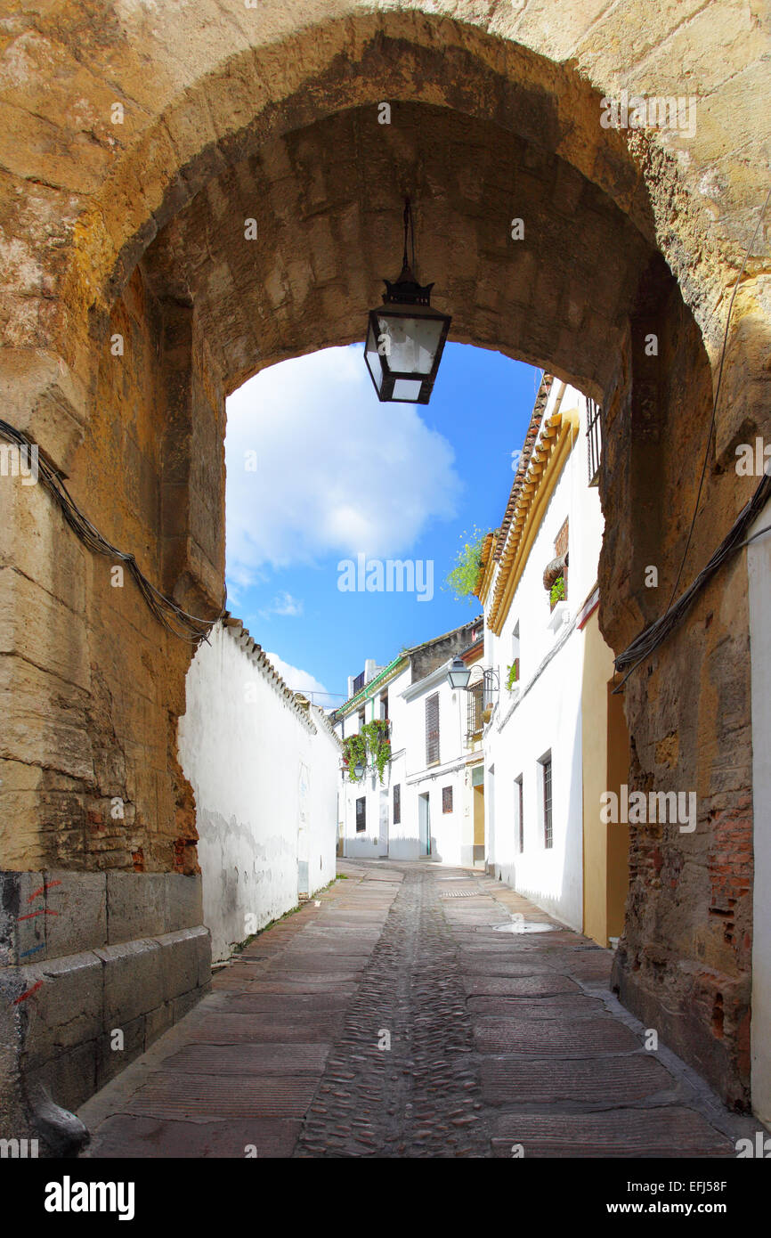 Ancient gate and street in Cordoba, Spain Stock Photo - Alamy