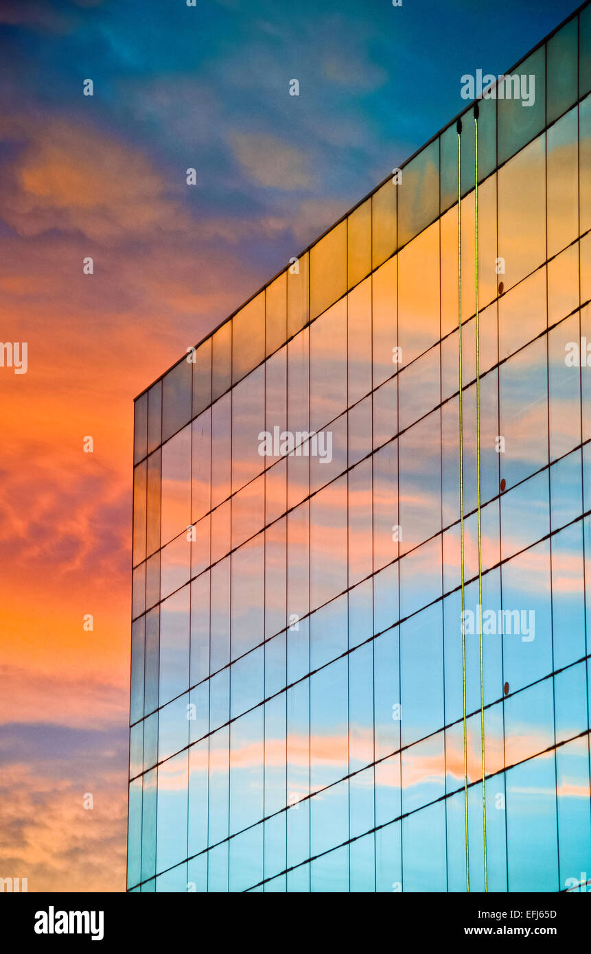 Sunset reflected on a building Stock Photo - Alamy