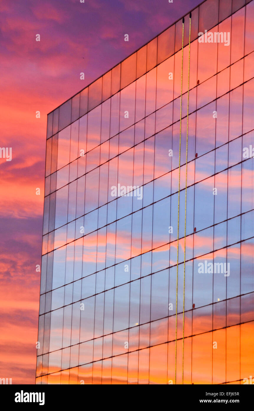 Sunset reflected on a building Stock Photo - Alamy