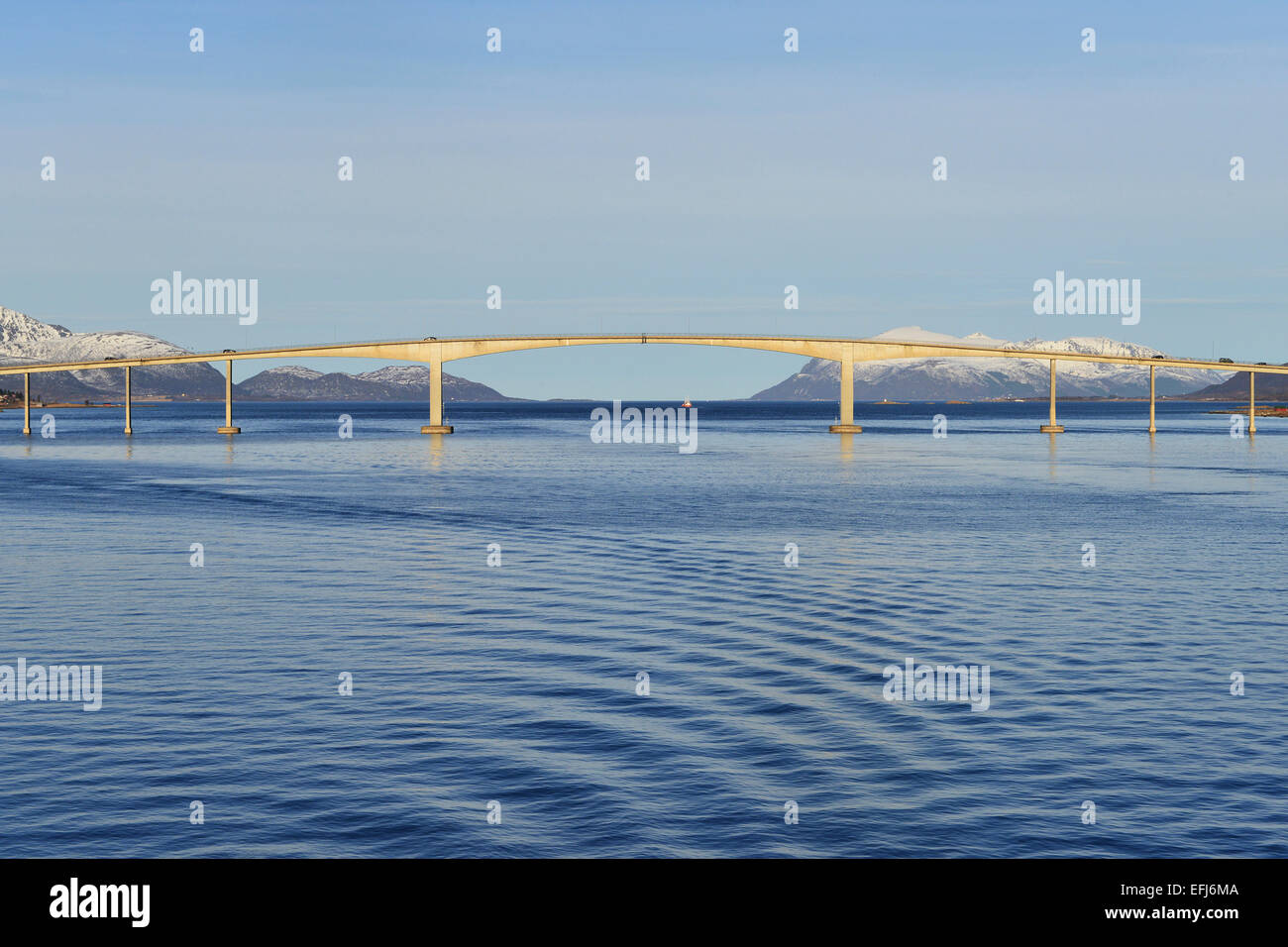 Sortland Bridge over wavy blue waters of Sortlandssundet strait ...