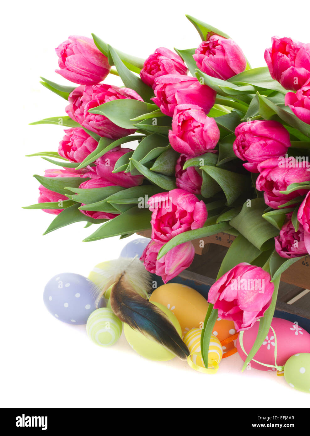 bouquet of multicolored tulip flowers in white pot Stock Photo - Alamy