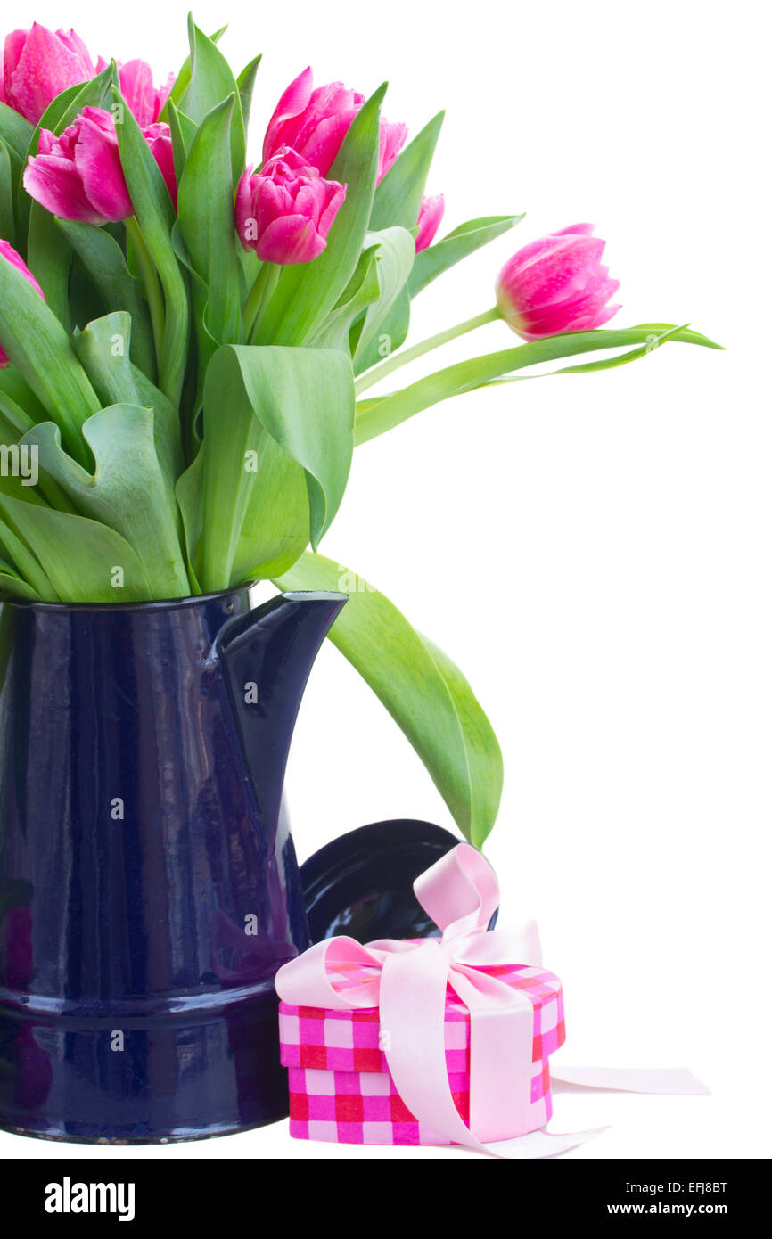 bouquet of multicolored tulip flowers in white pot Stock Photo - Alamy