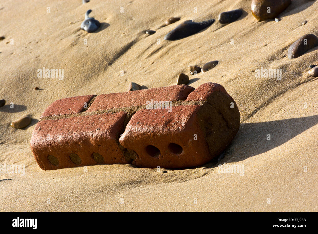 Bricks on beach Stock Photo - Alamy
