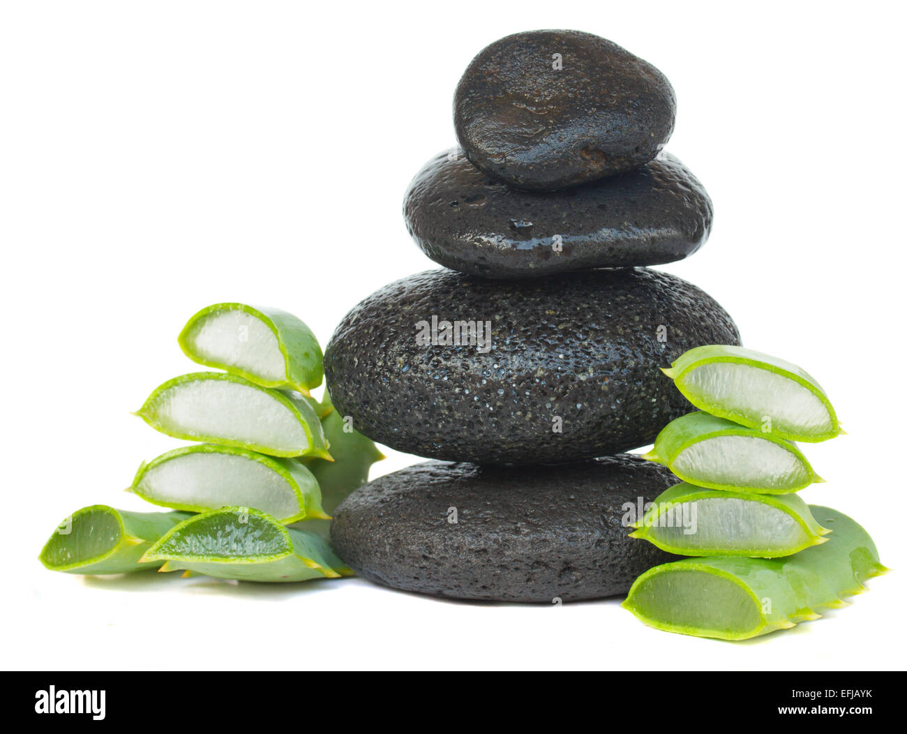 massage stones with aloe vera Stock Photo - Alamy