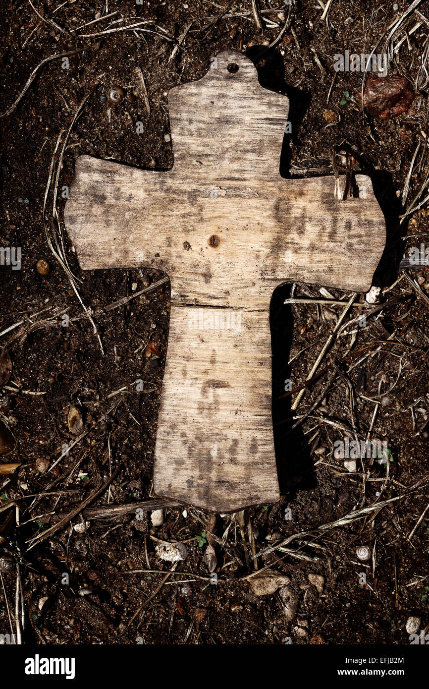 Old wooden cross lying on a ground Stock Photo - Alamy