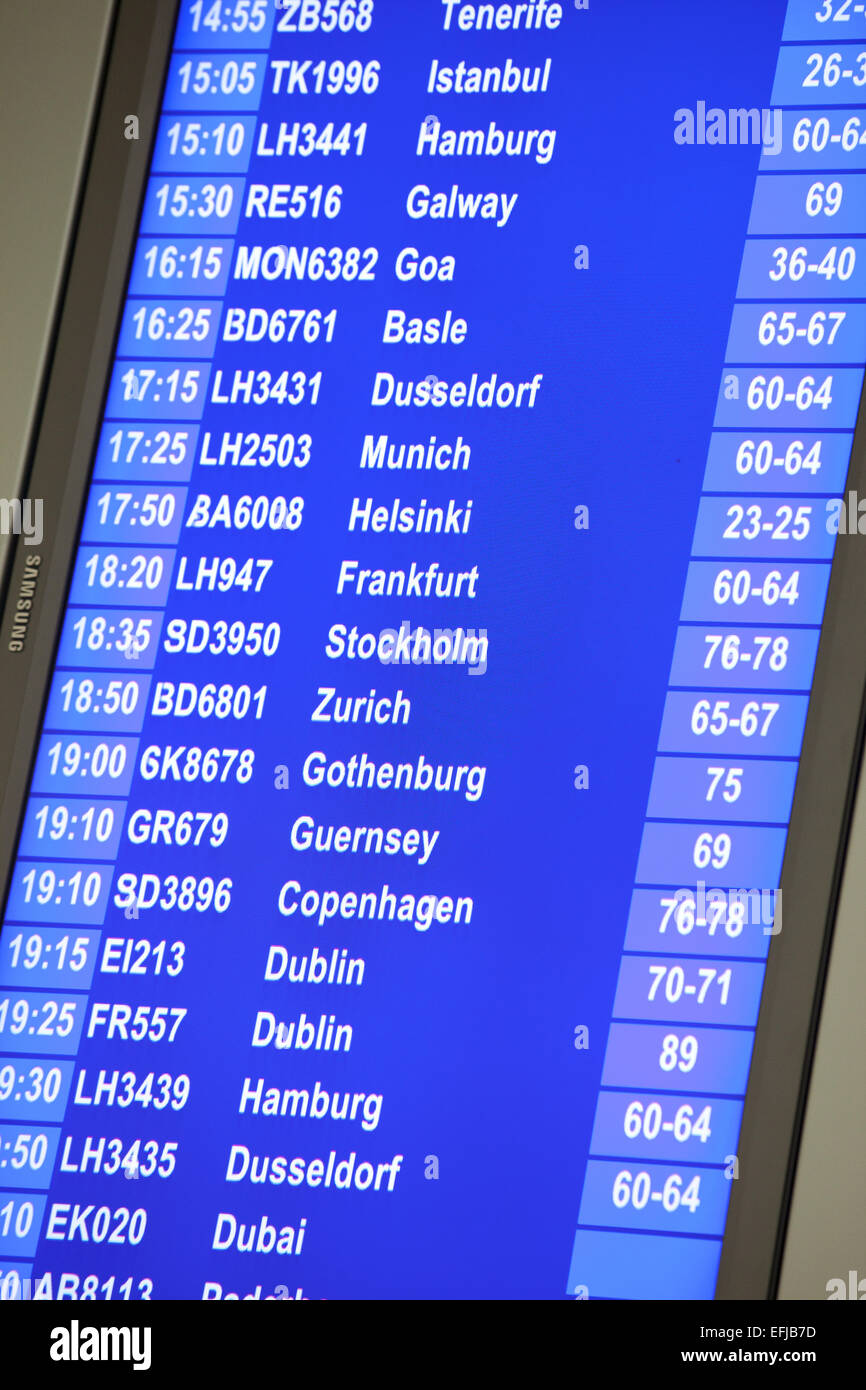 Destination board for aeroplane flights at Manchester Airport Stock ...