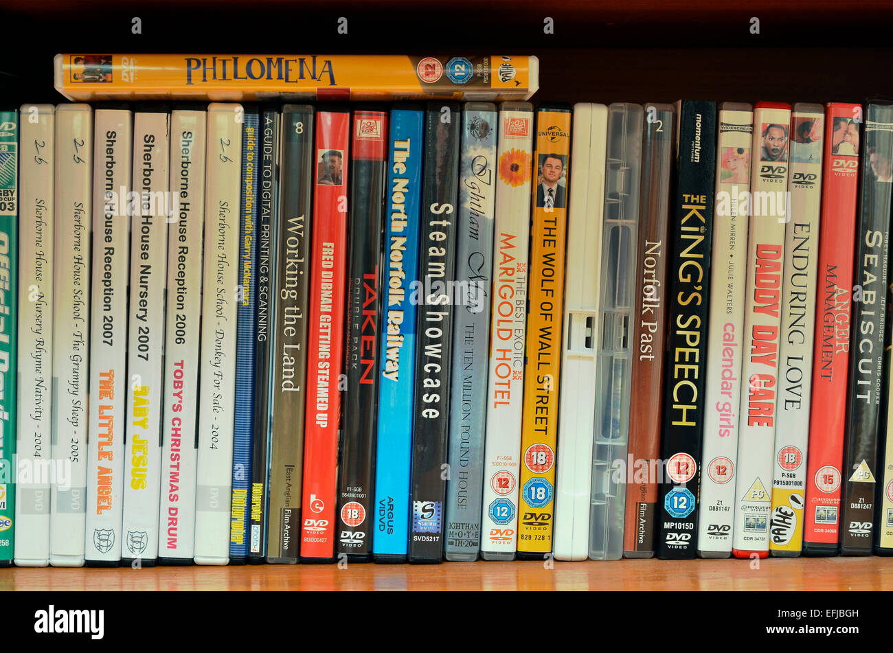 A shelf holding an esoteric collection of DVDs Stock Photo - Alamy