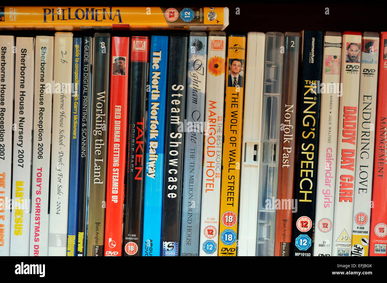 A shelf holding an esoteric collection of DVDs Stock Photo - Alamy