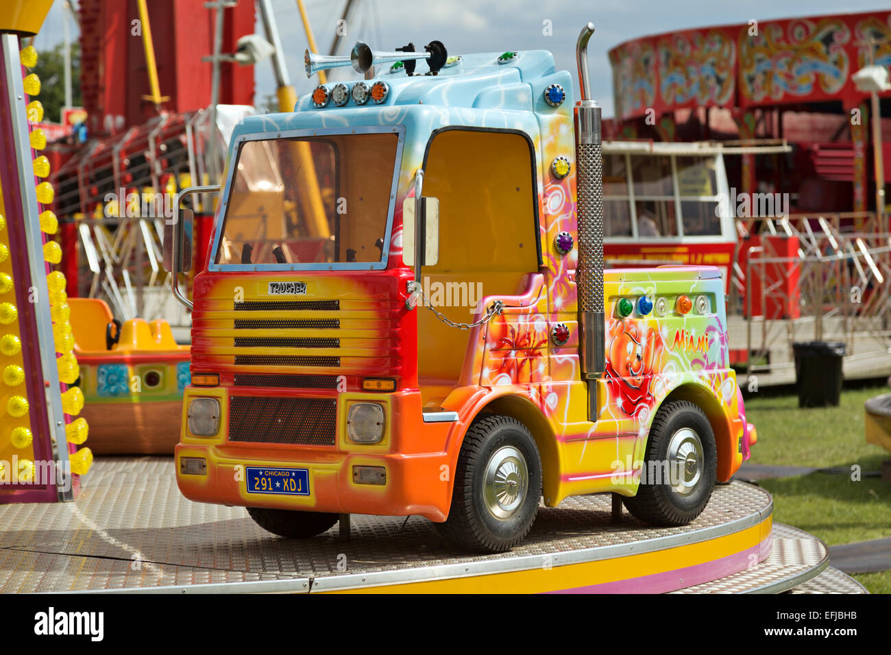Colourful truck on Funfair ride Stock Photo - Alamy