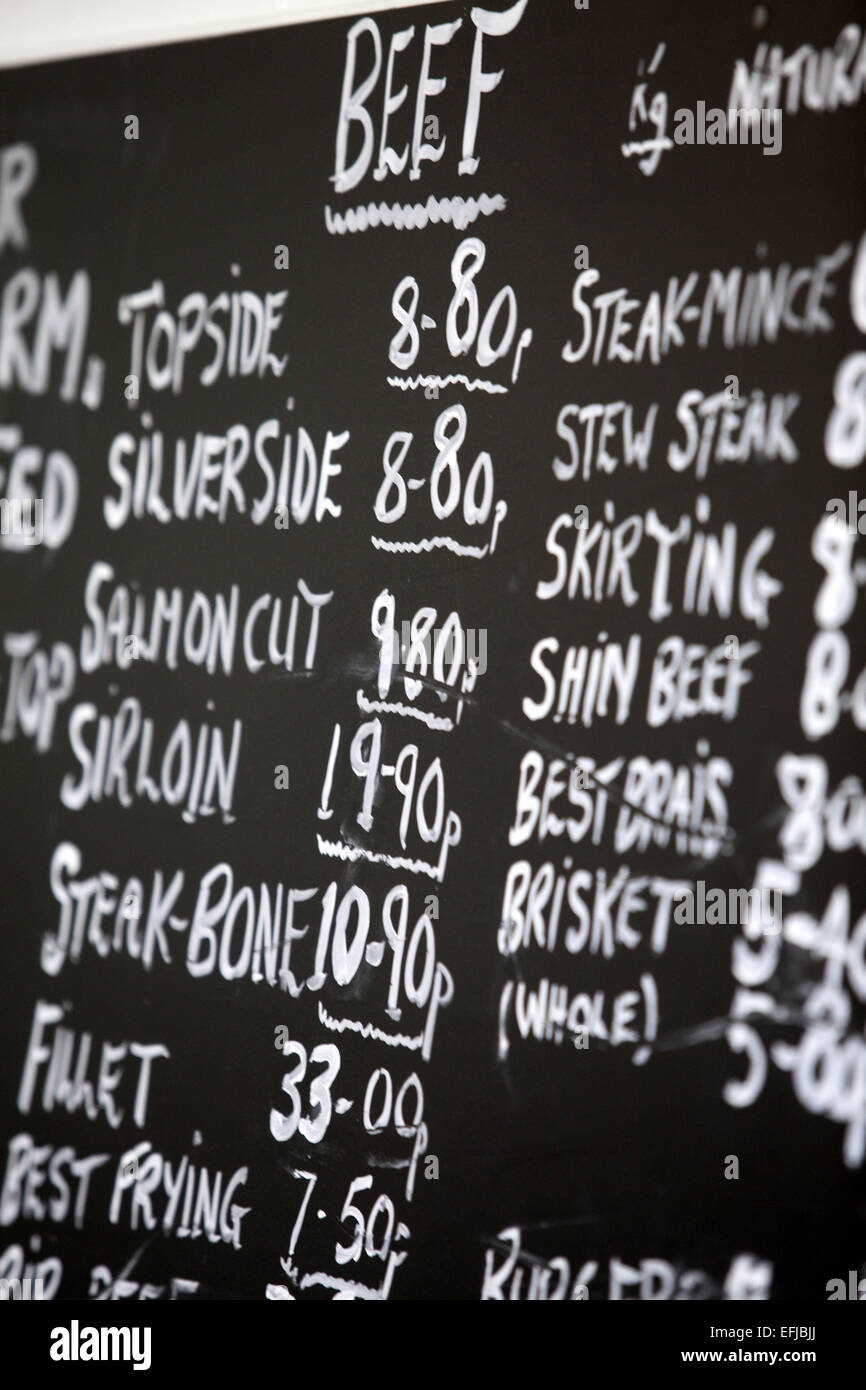 Butchers shop in UK price list Stock Photo - Alamy