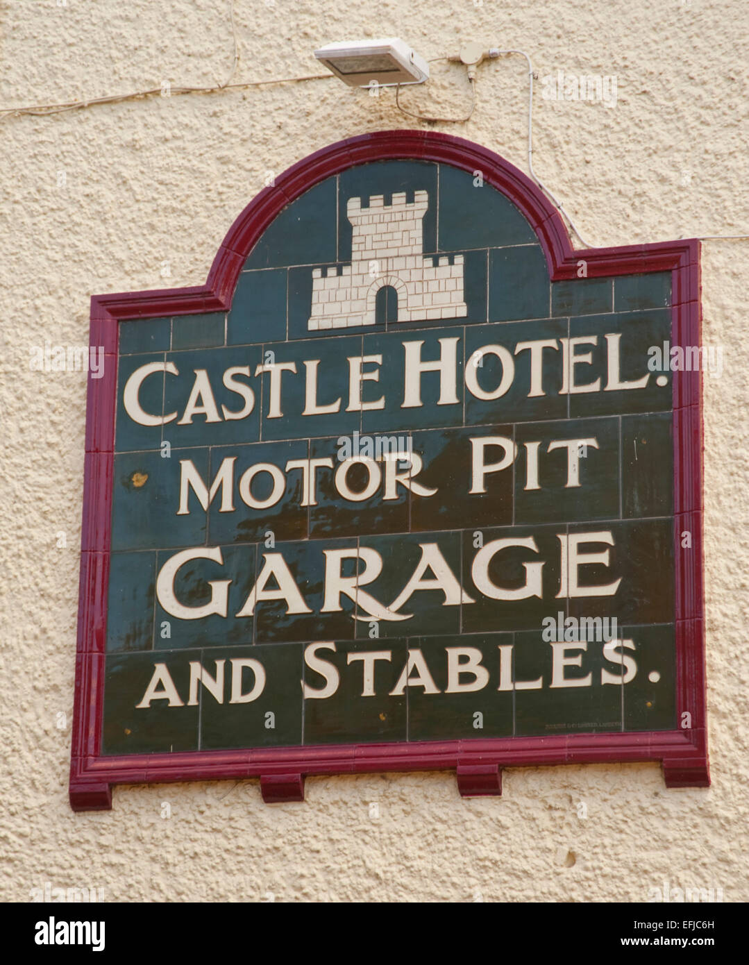 The old tiled sign on the side of a pub in Eynesford kent advertising ...