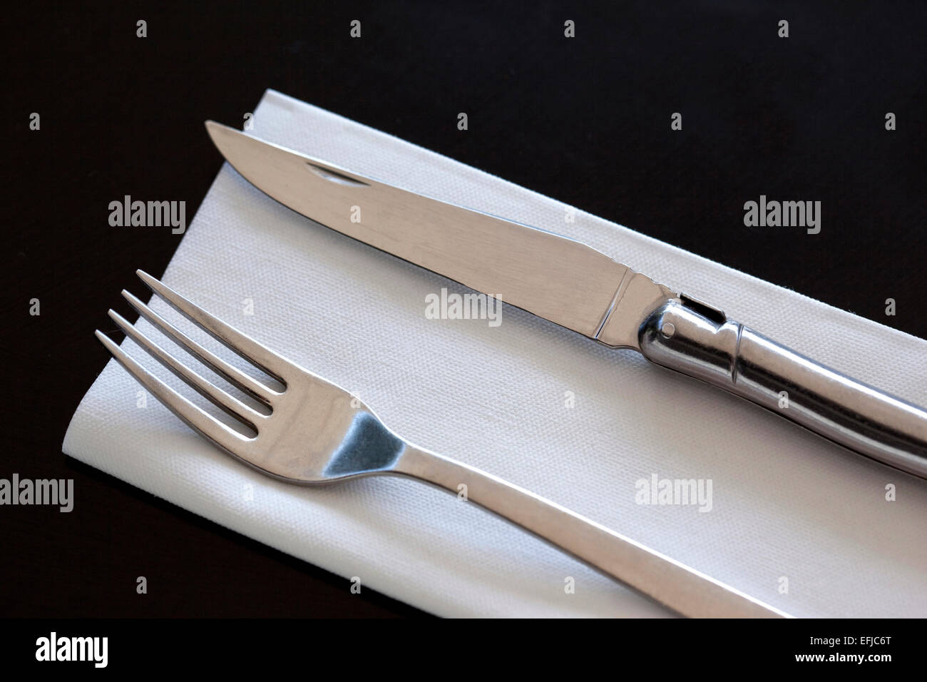 Black napkin with fork and knife hi-res stock photography and images ...