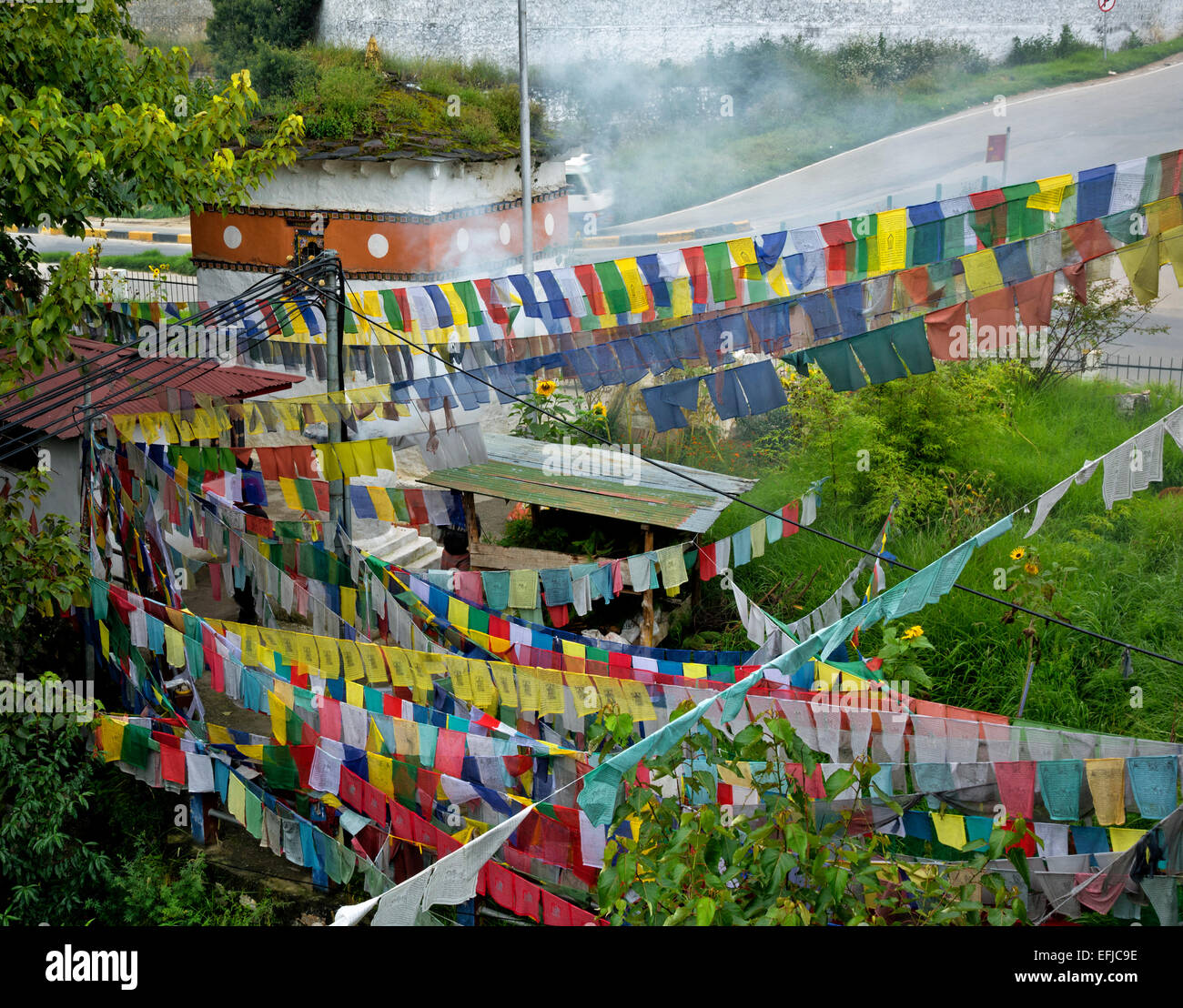 BHUTAN - Prayer flags and smoke from the burning of incense and ...