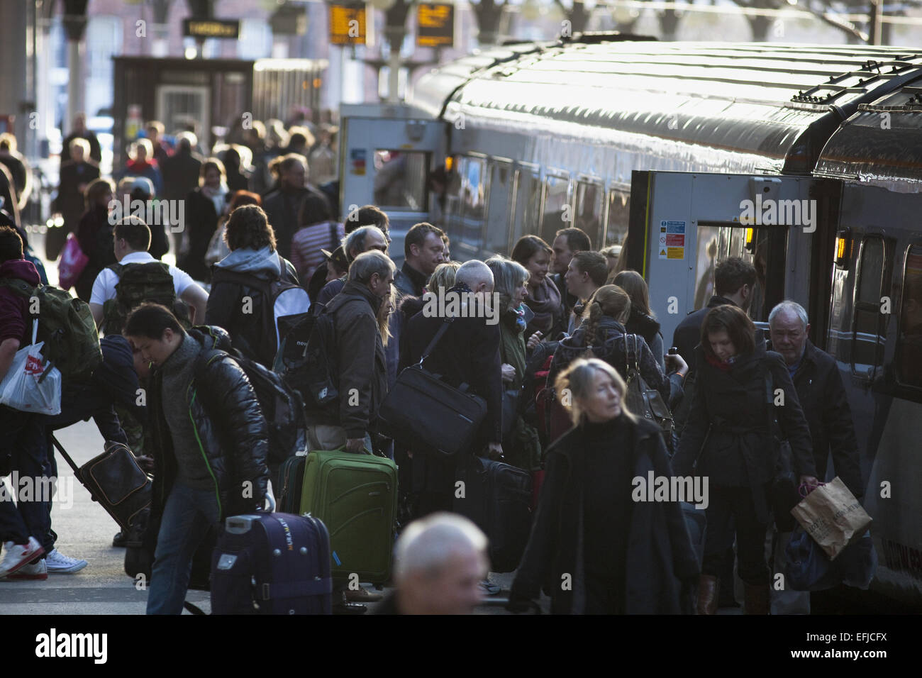 Passengers board train from platform hi-res stock photography and ...